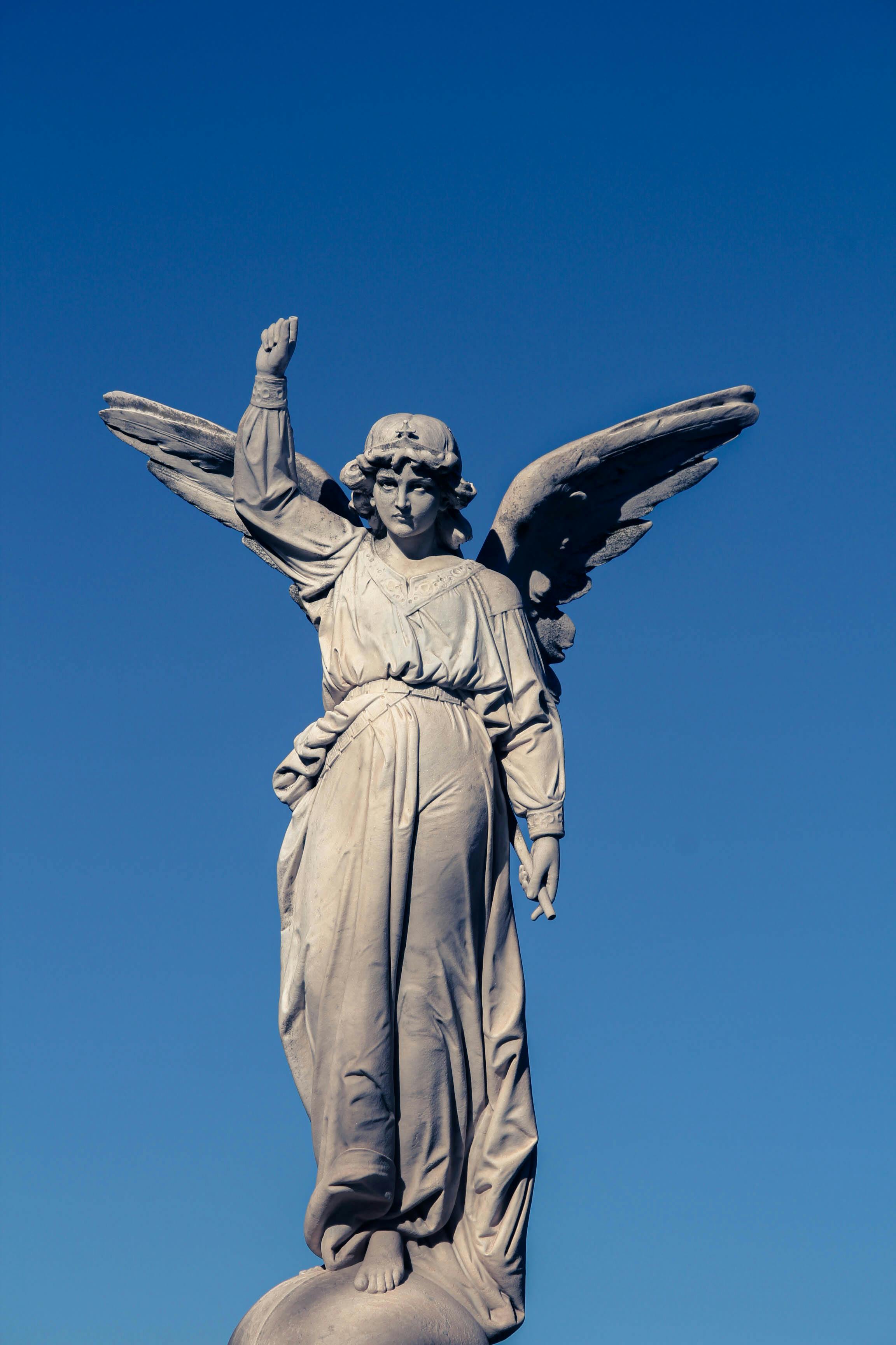 Shallow Focus Architectural Photography of Angel Statue · Free Stock Photo