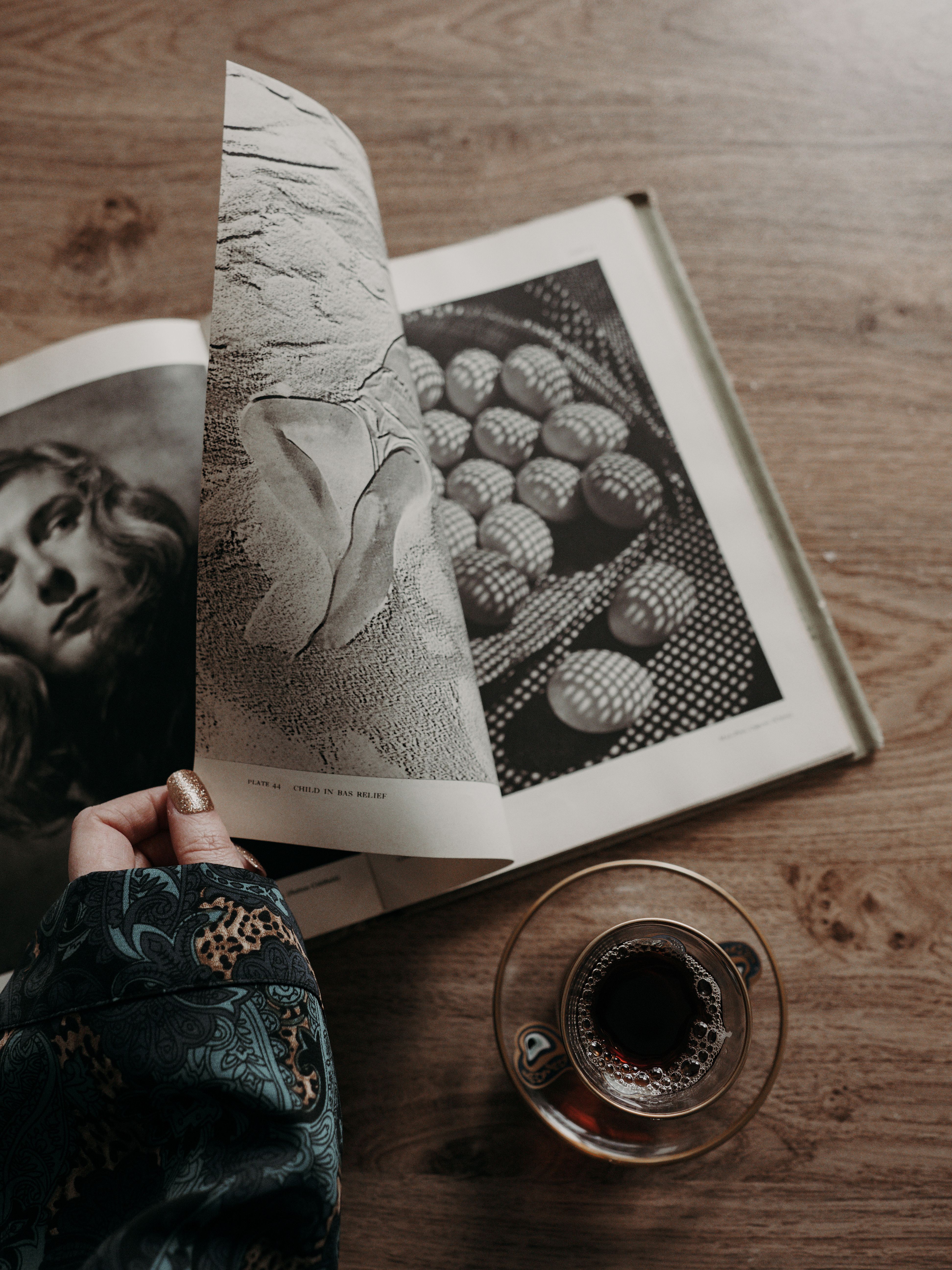 Woman Hand Holding Book Page · Free Stock Photo