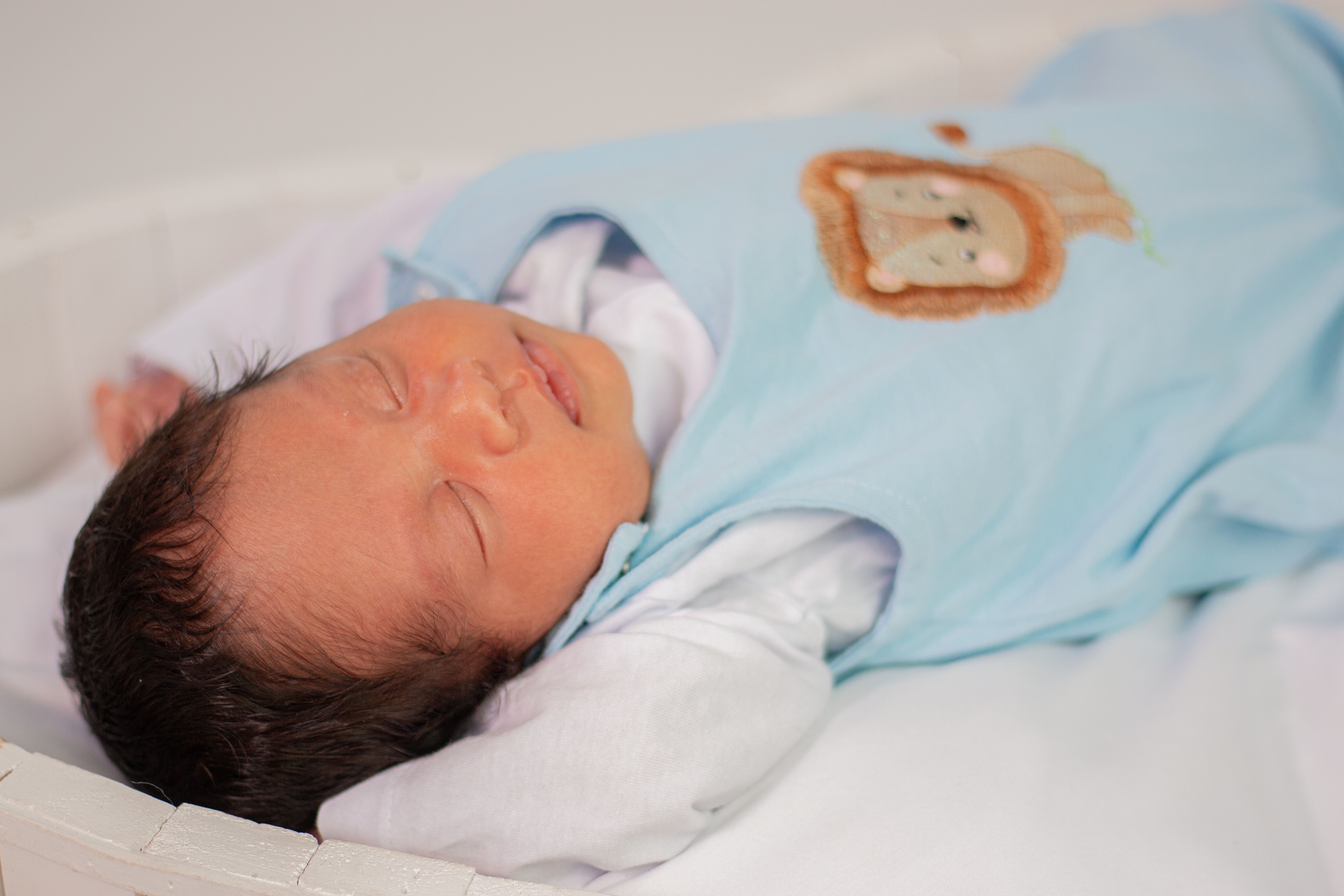 Photo Of New Born Baby Covered With Blue Blanket · Free Stock Photo