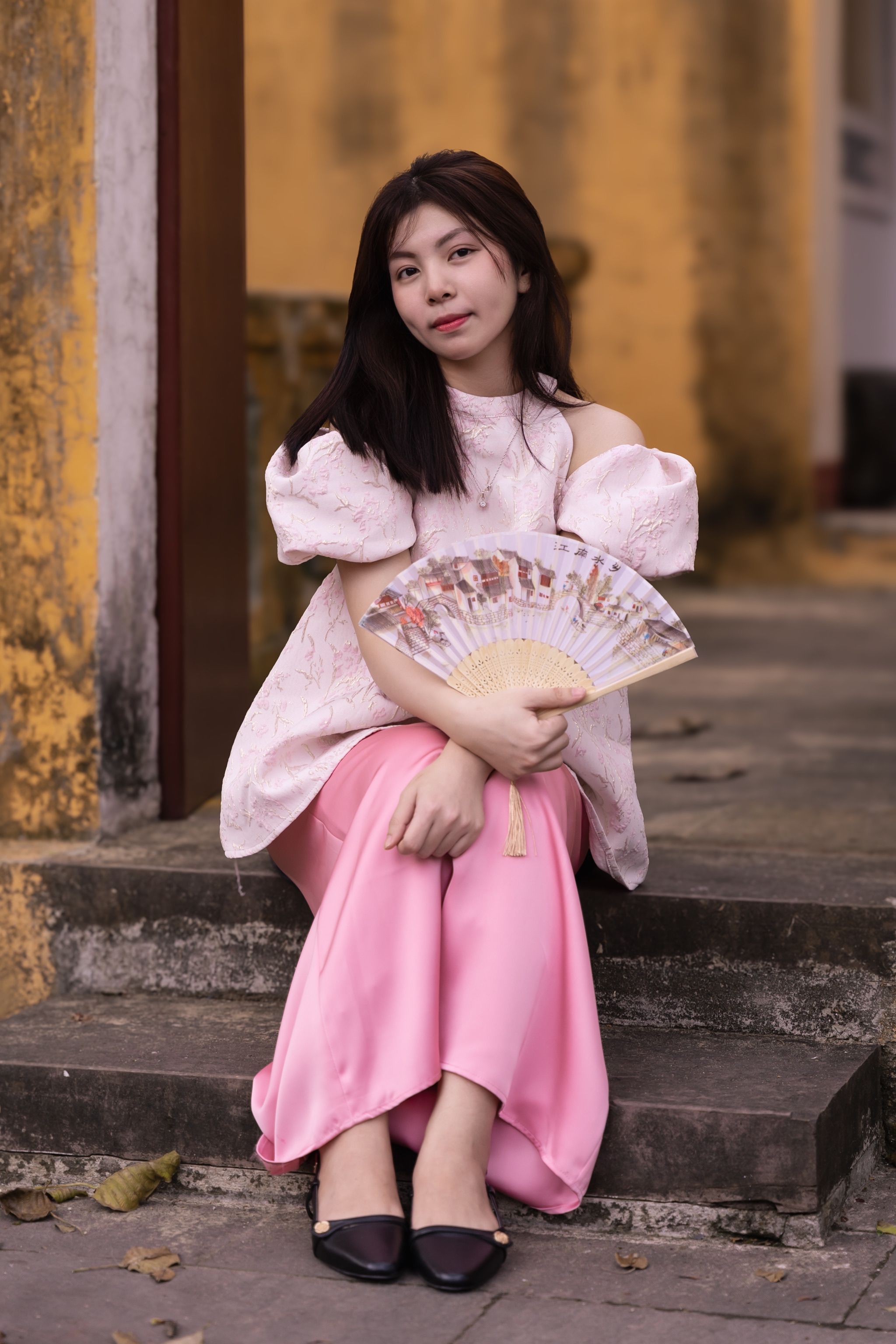 Girl Holding a Hand Fan · Free Stock Photo