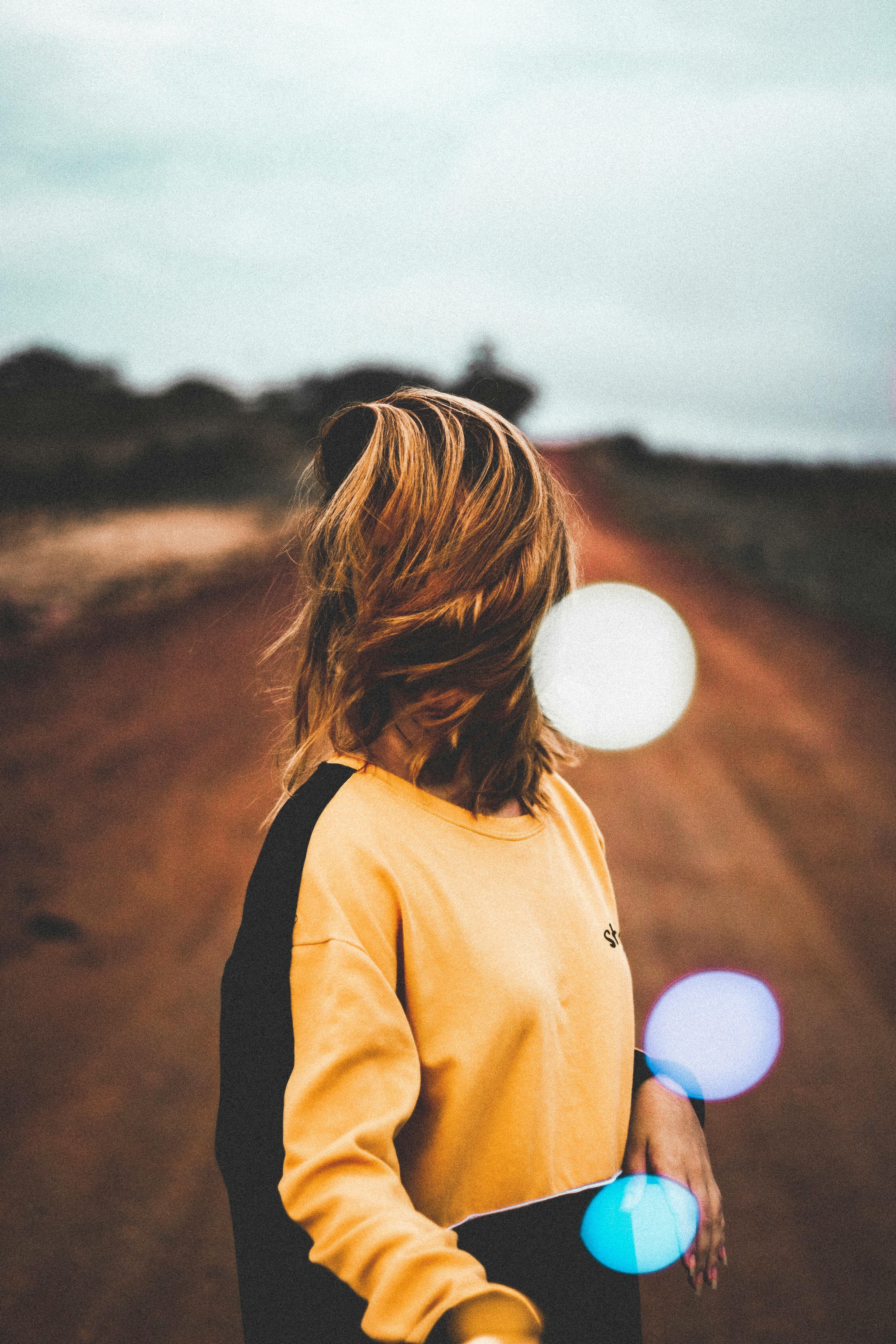 Woman Turning Her Head At The Back · Free Stock Photo