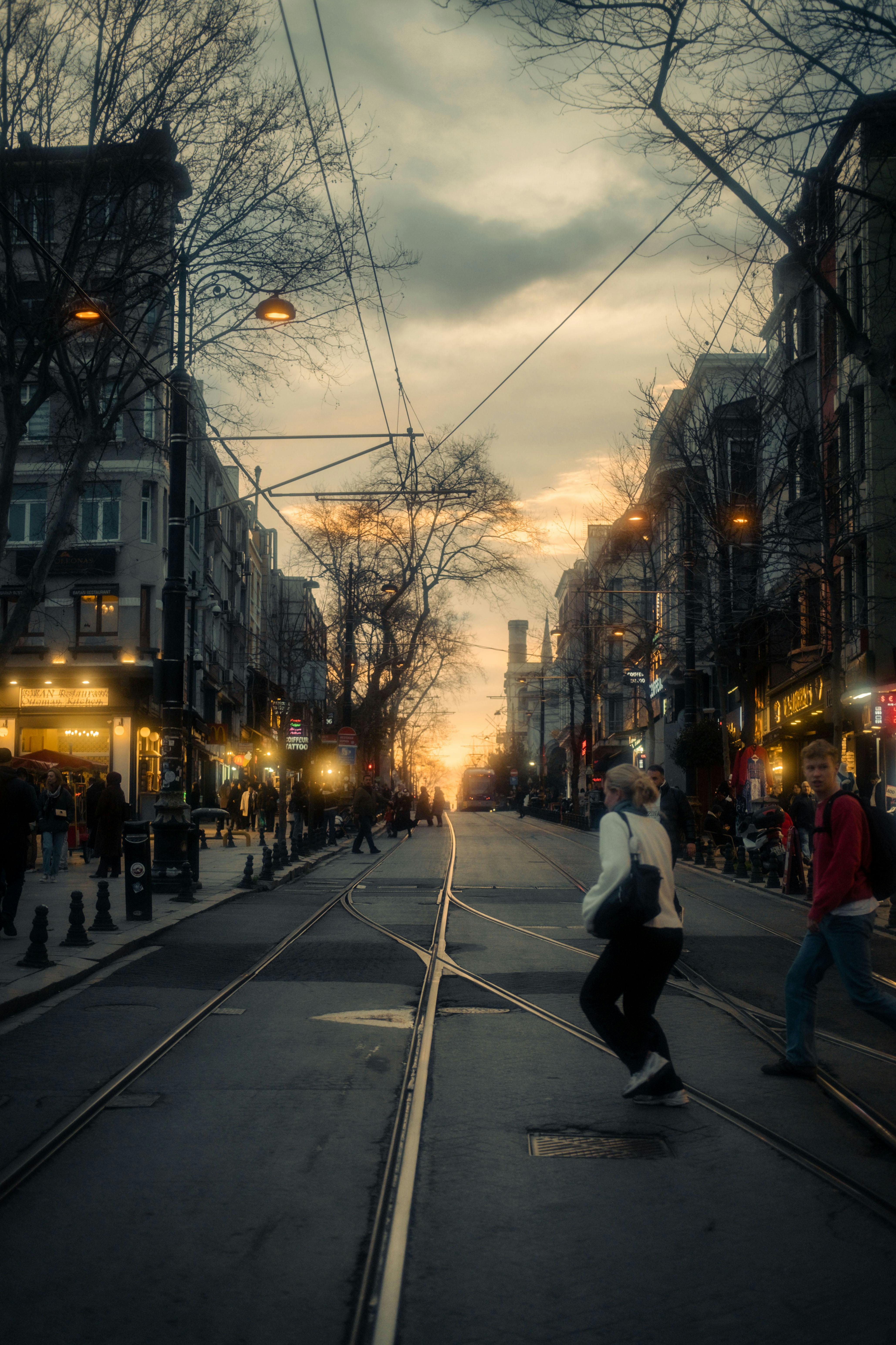 Woman Running across Street at Sunset · Free Stock Photo
