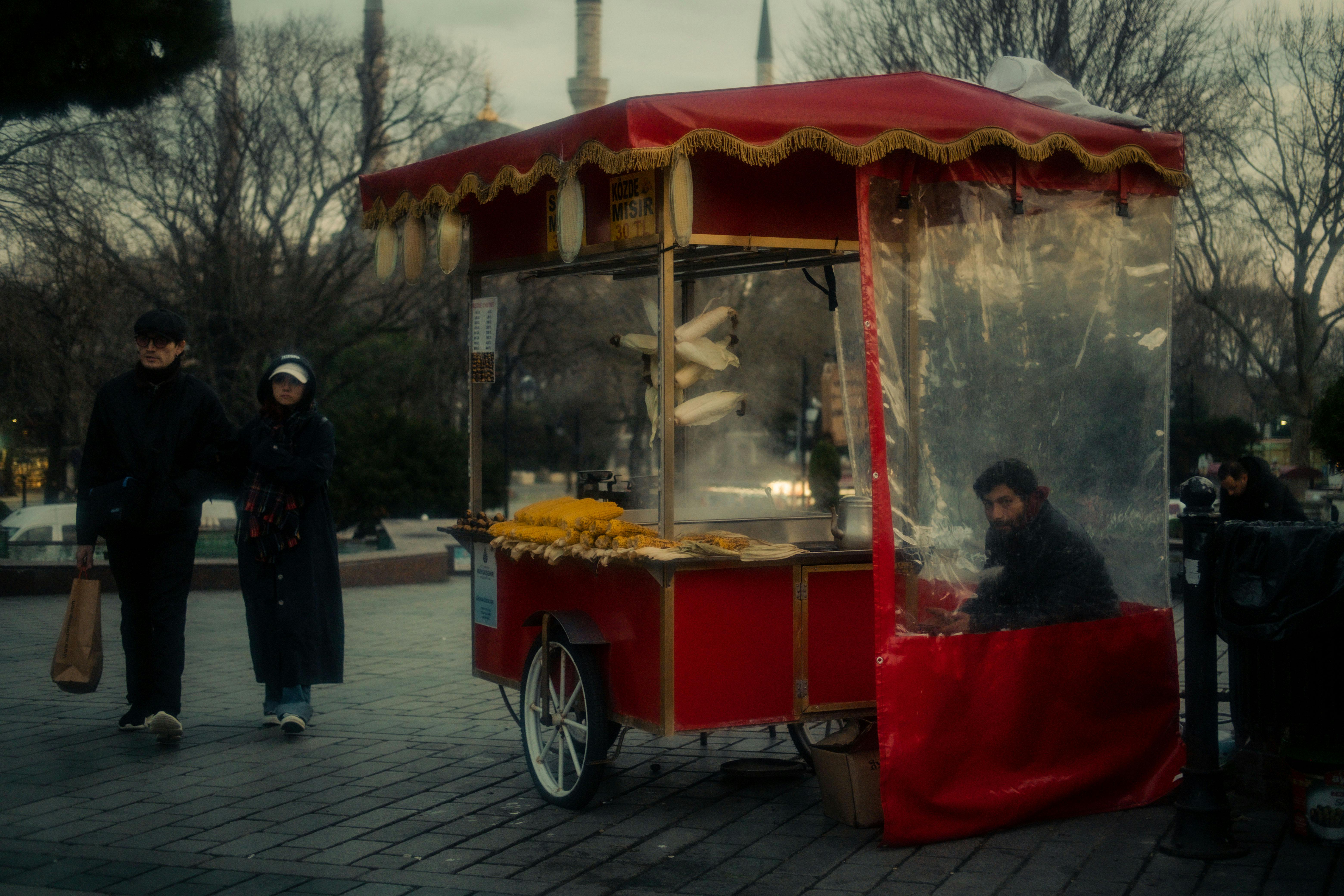 Corn on Cob Food Stall on Plaza · Free Stock Photo