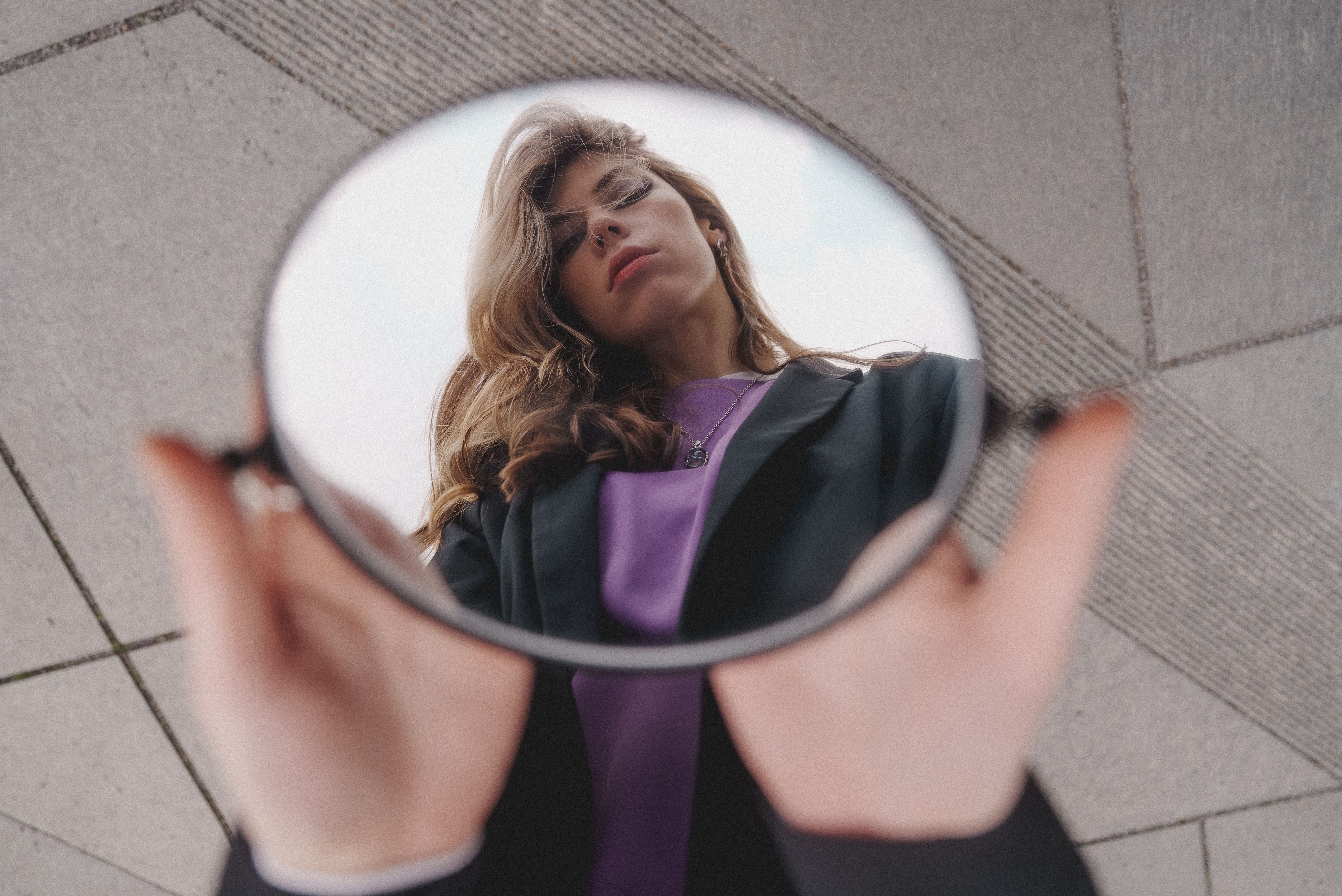 Reflection of a Beautiful Woman in a Small Mirror · Free Stock Photo