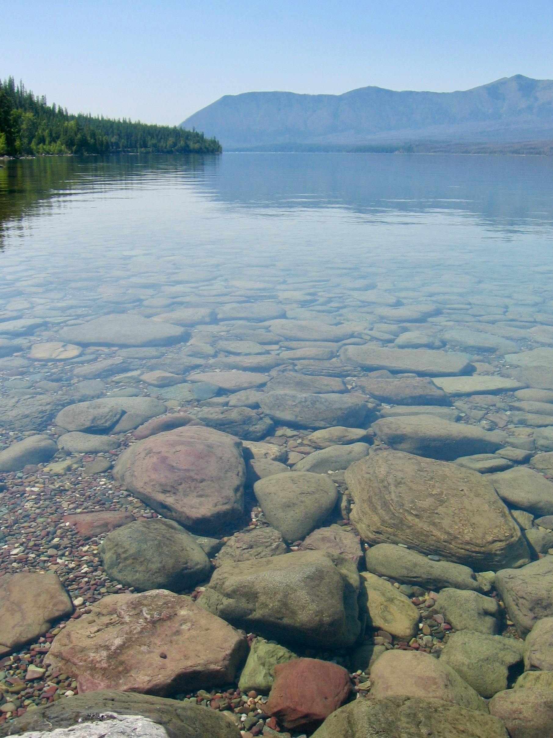 Reflection on Rocks Underneath a Lake · Free Stock Photo