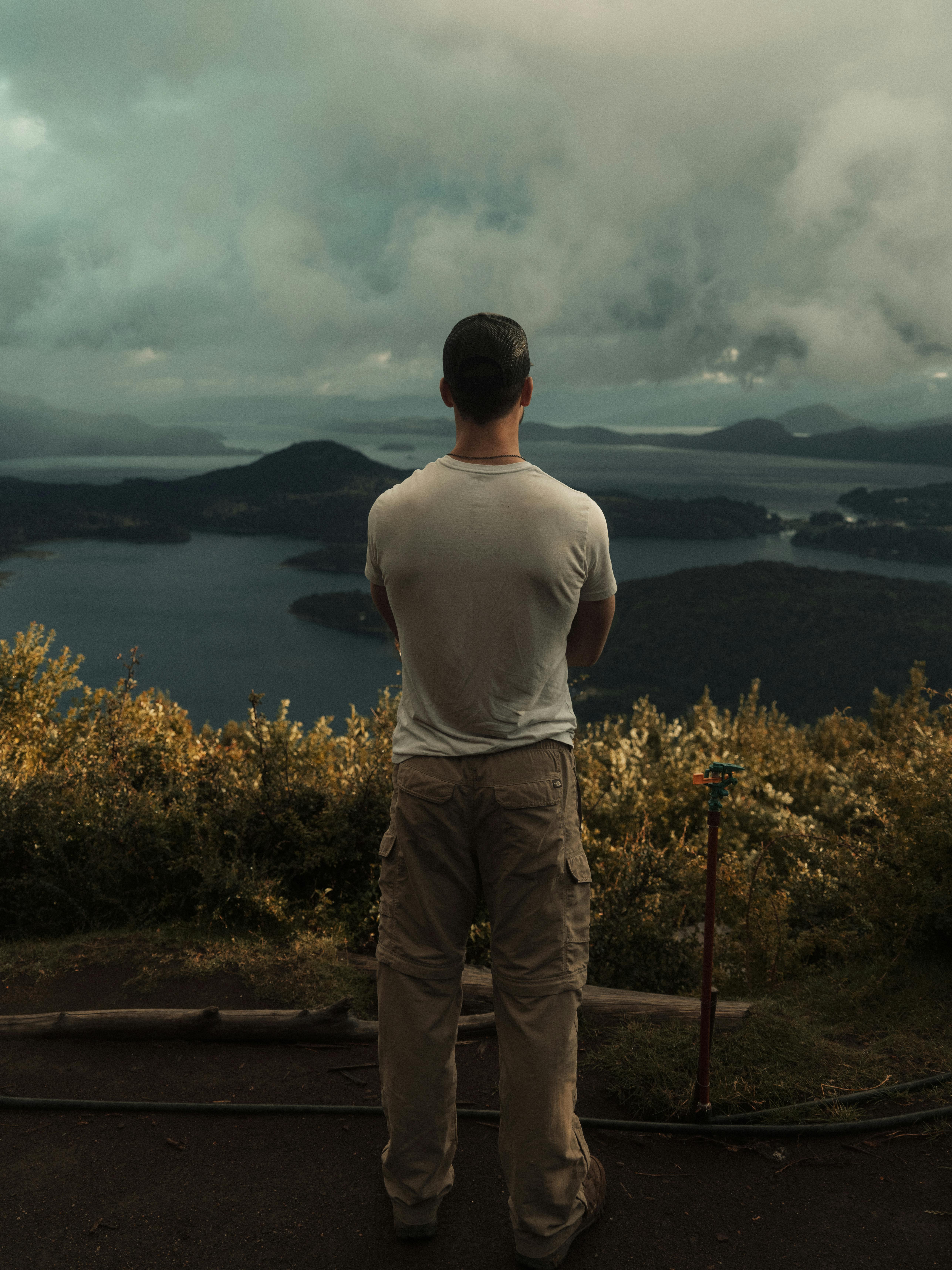 Back View of a Man Standing Above the Rio Negro · Free Stock Photo