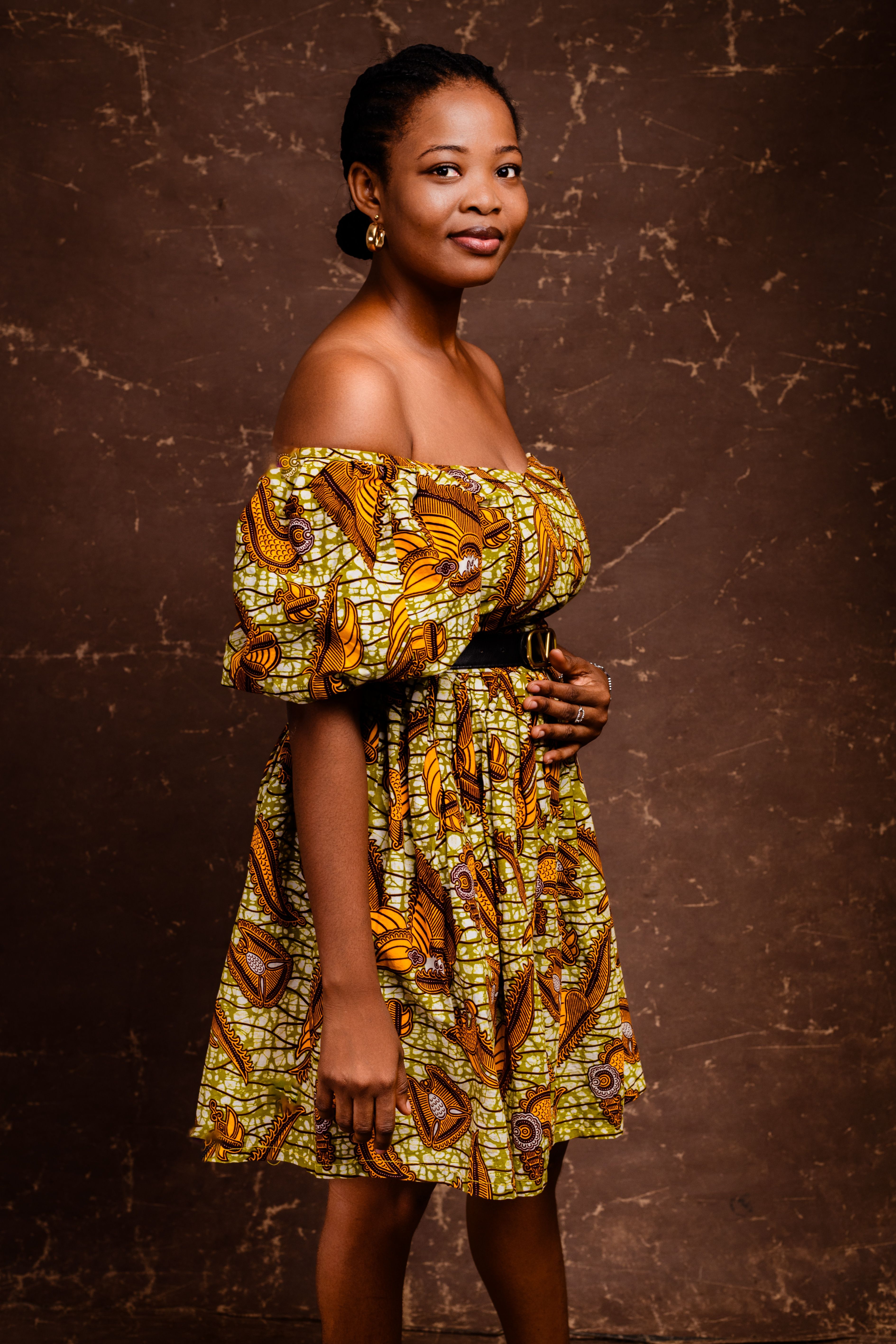 Fashion Model in Patterned Dress · Free Stock Photo