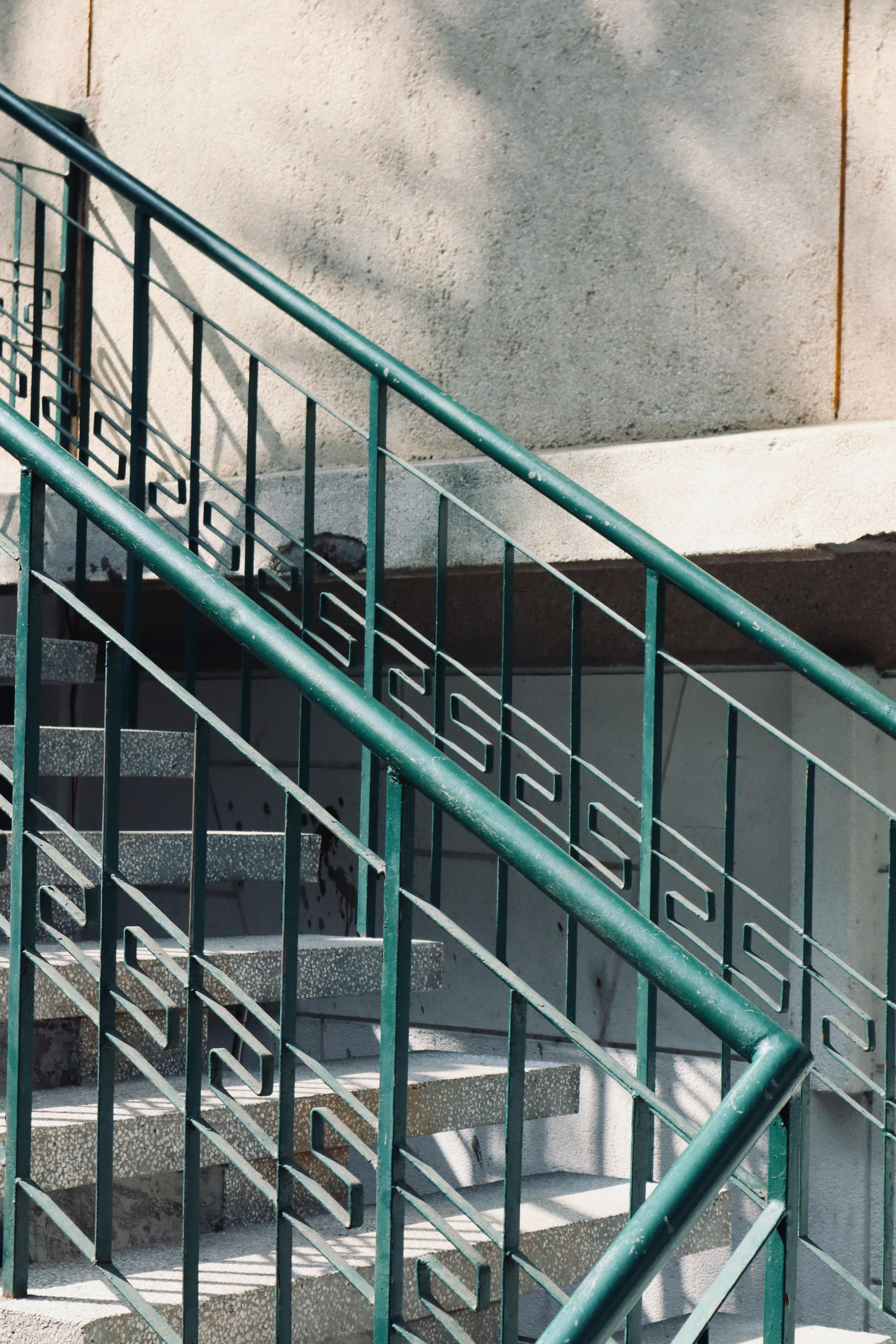 Close-up of Stairs with Green Railing Outside of a Building · Free ...