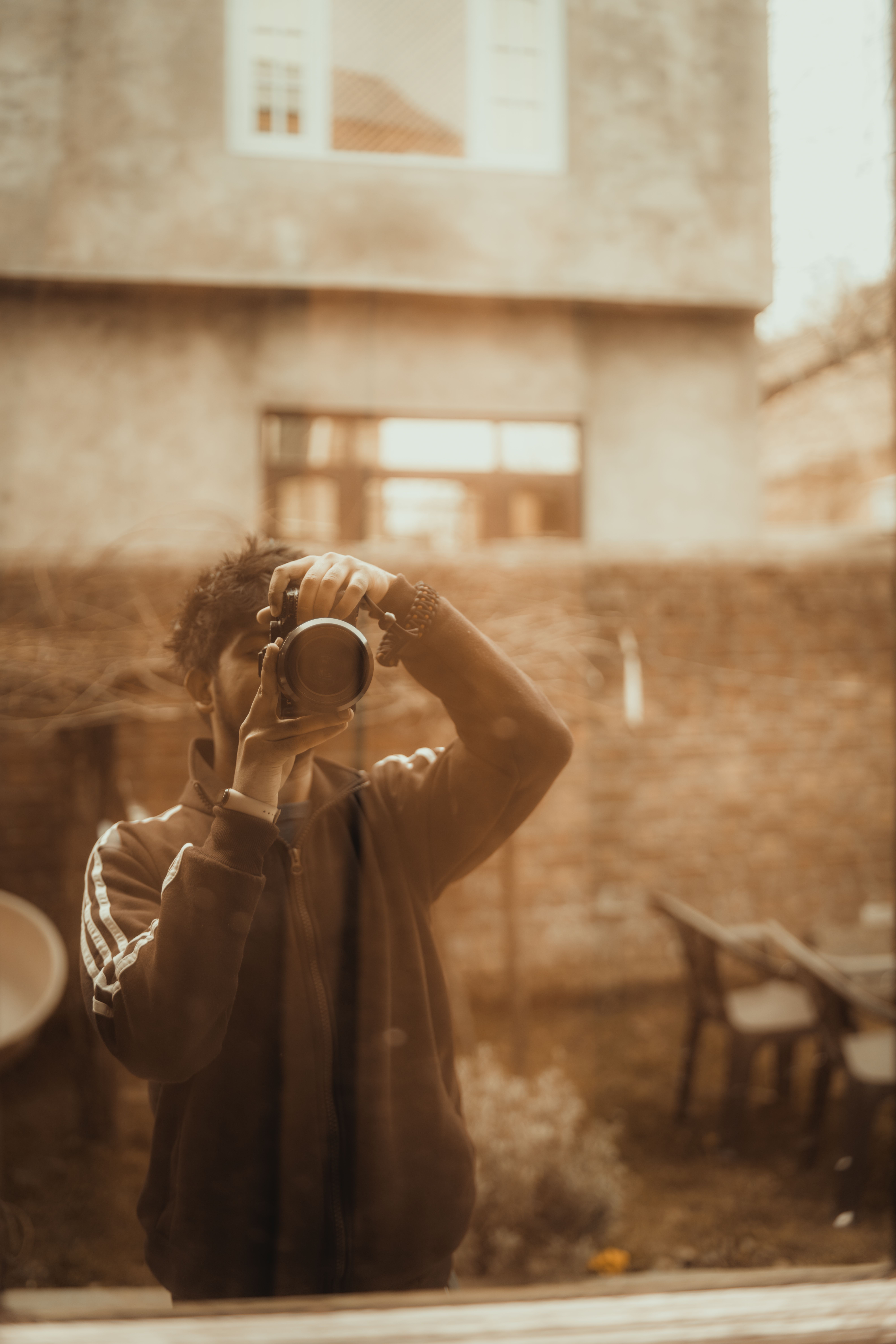 Man with Camera Taking Pictures behind Window · Free Stock Photo