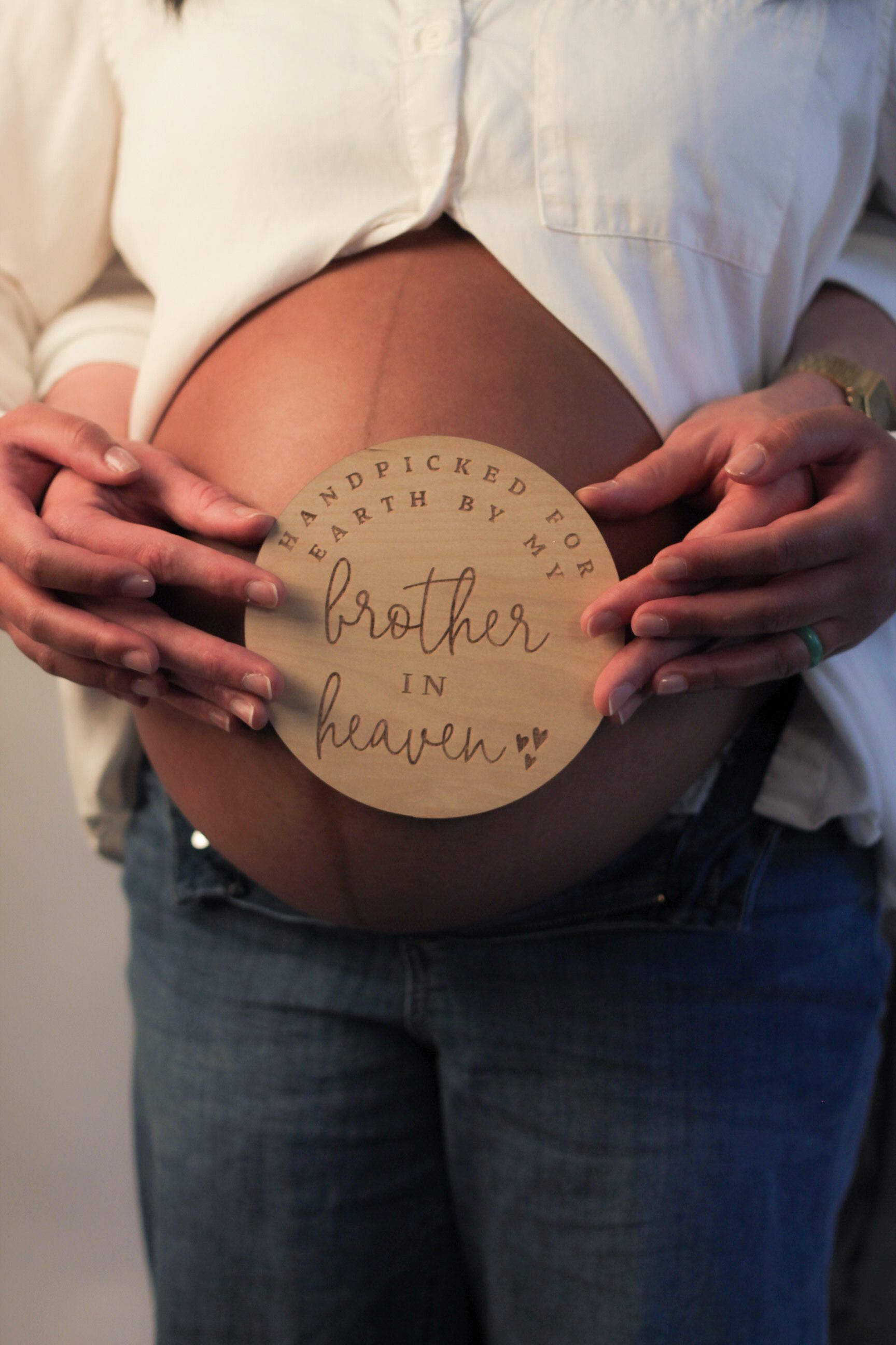 Close-up of a Womans Belly With a Sign · Free Stock Photo