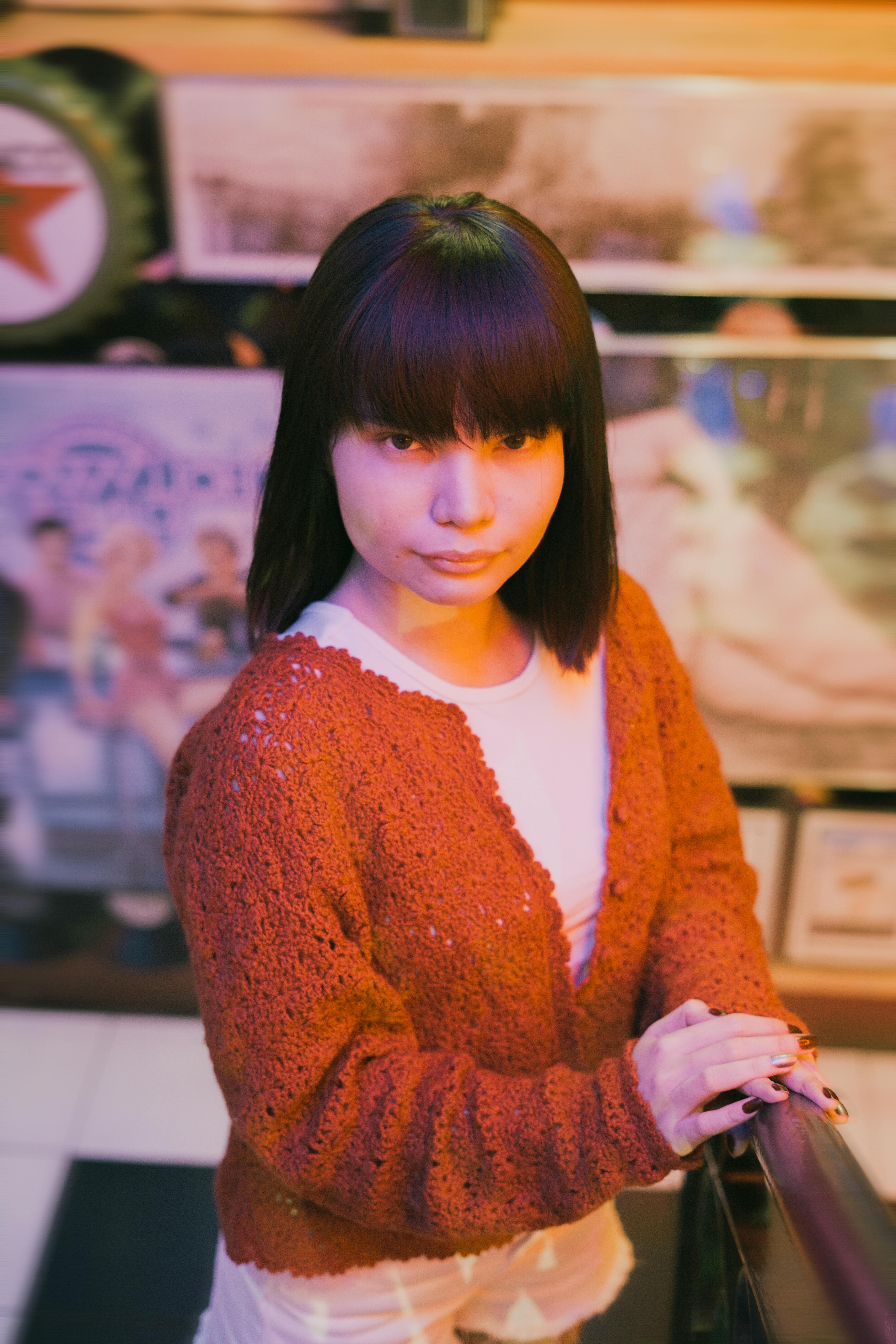 Woman in a Red Sweating Staring · Free Stock Photo