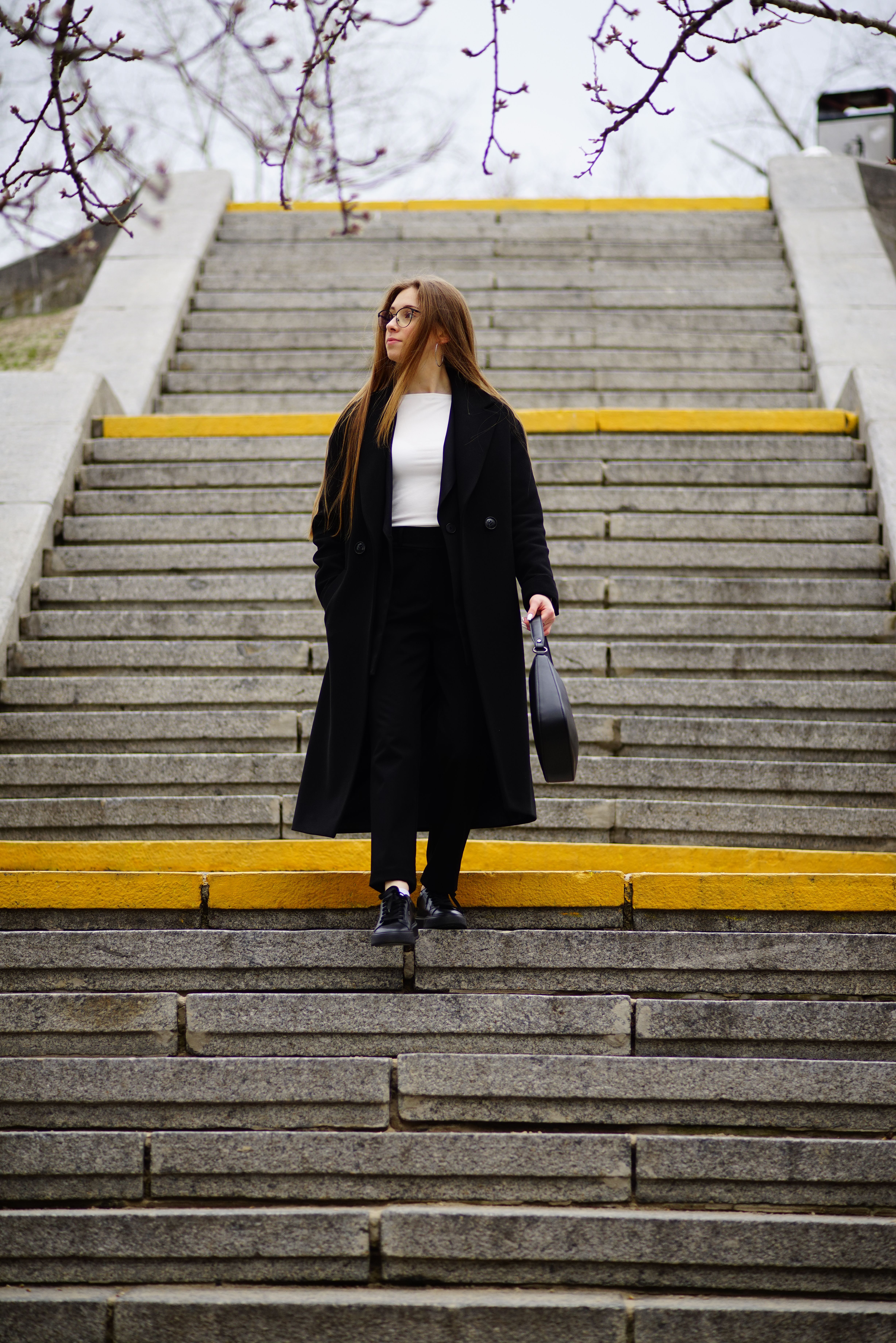 Woman Going Down the Stairs · Free Stock Photo