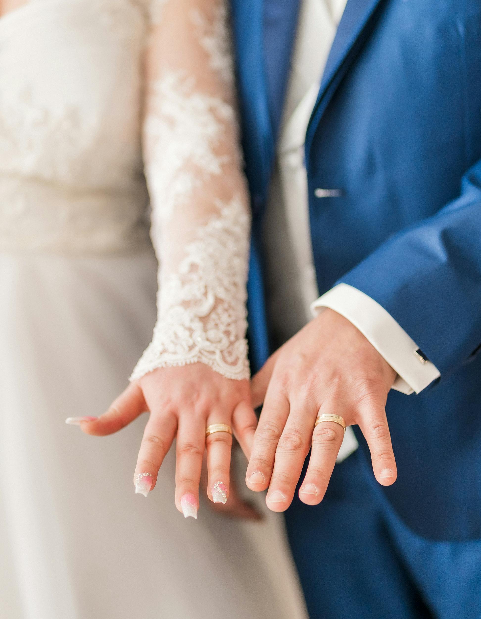 Bride and Groom Showing Their Wedding Rings · Free Stock Photo