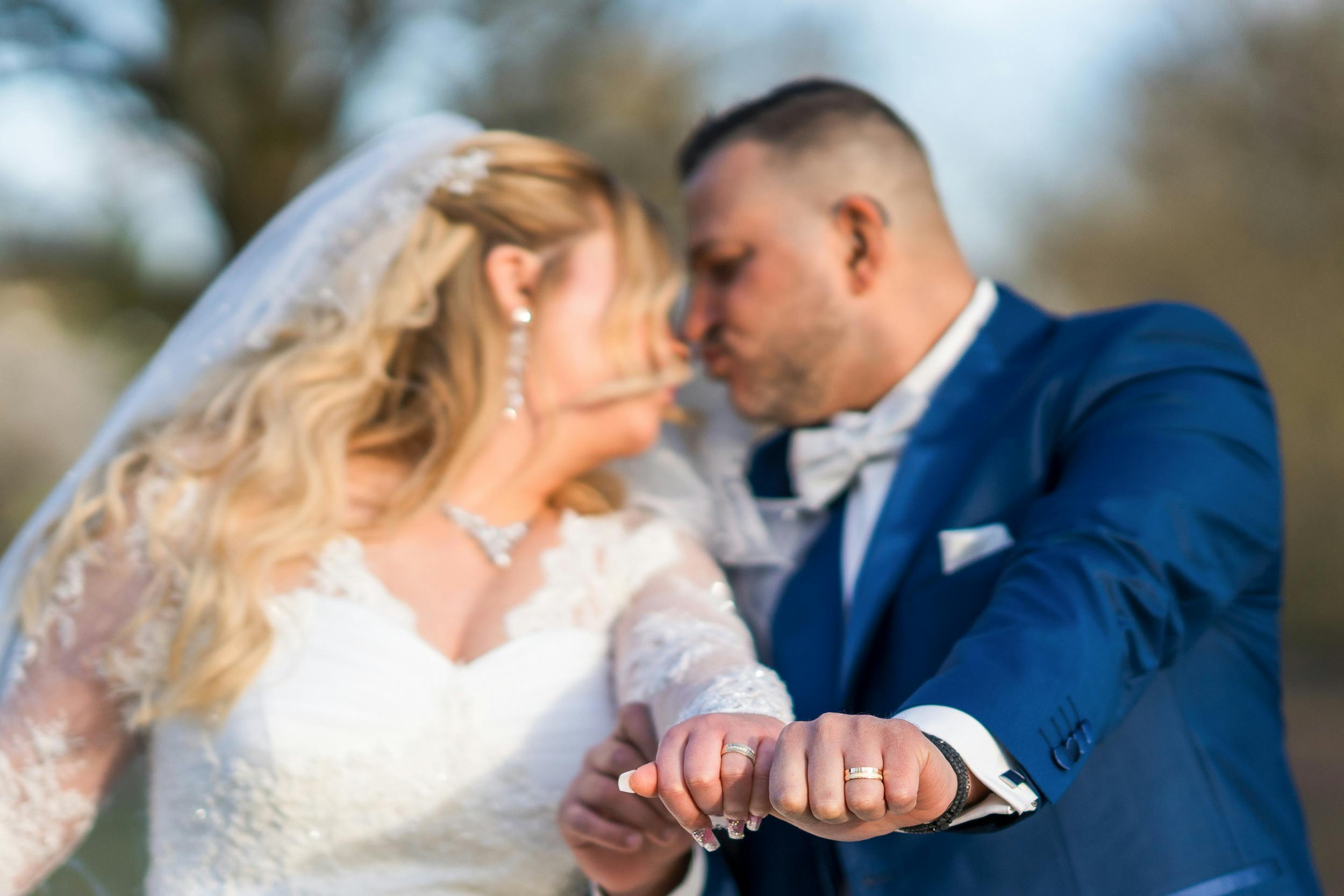 Bride and Groom Showing Their Wedding Rings · Free Stock Photo
