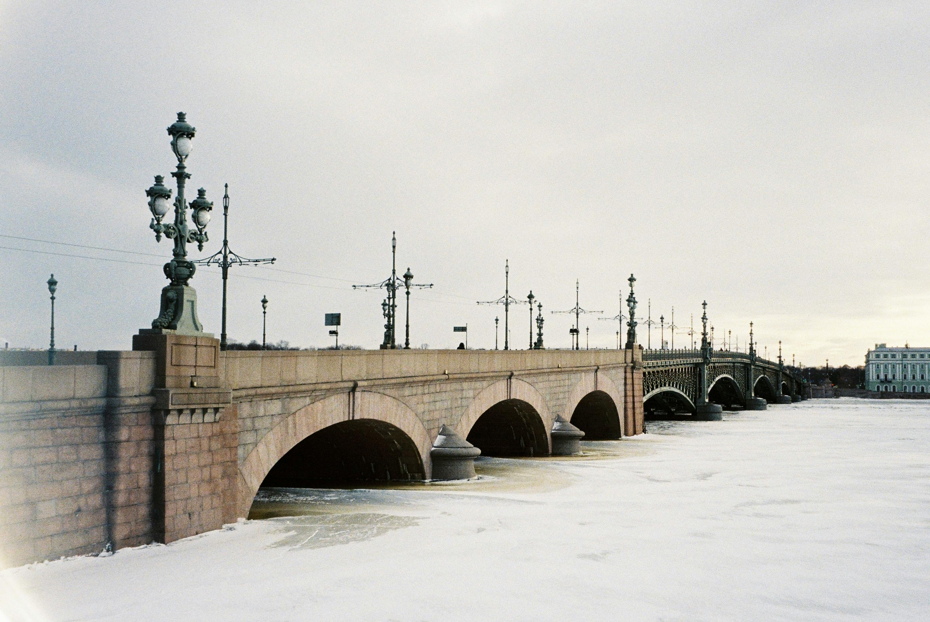Frozen River under Troitskiy Bridge in St Petersburg · Free Stock Photo