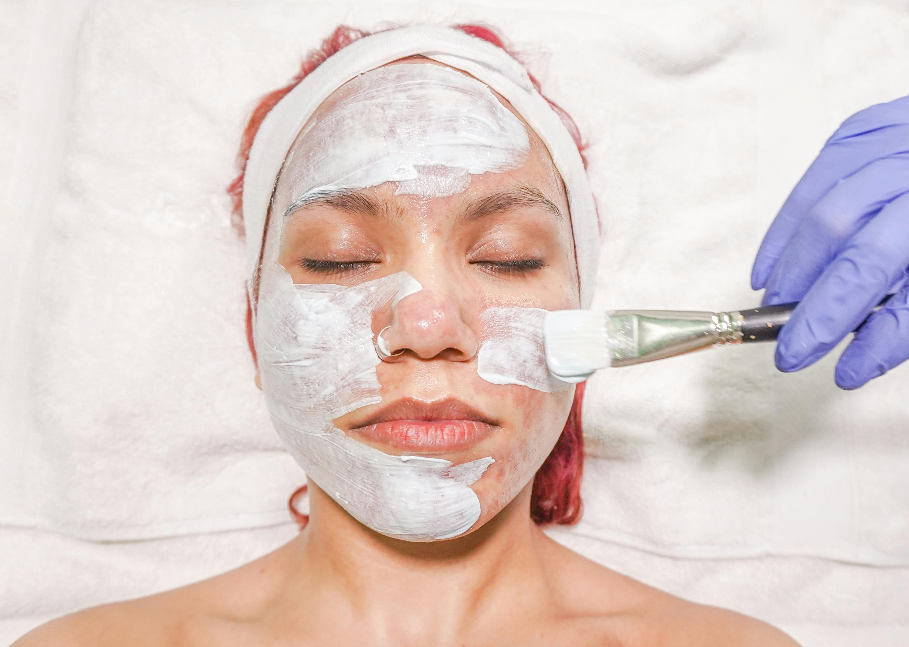 Applying Cream on Woman Face · Free Stock Photo