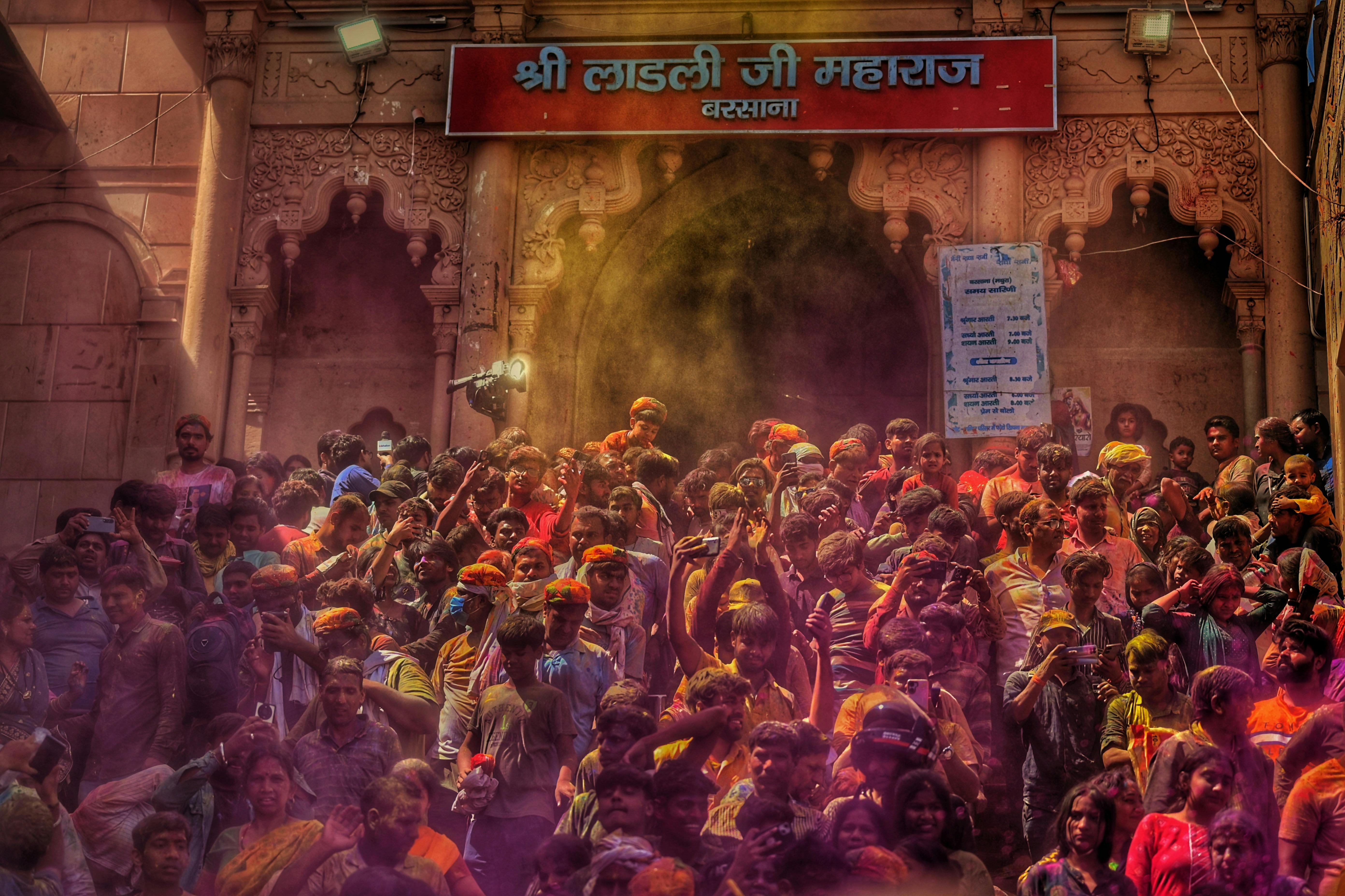 A crowd of people are celebrating holi in india · Free Stock Photo