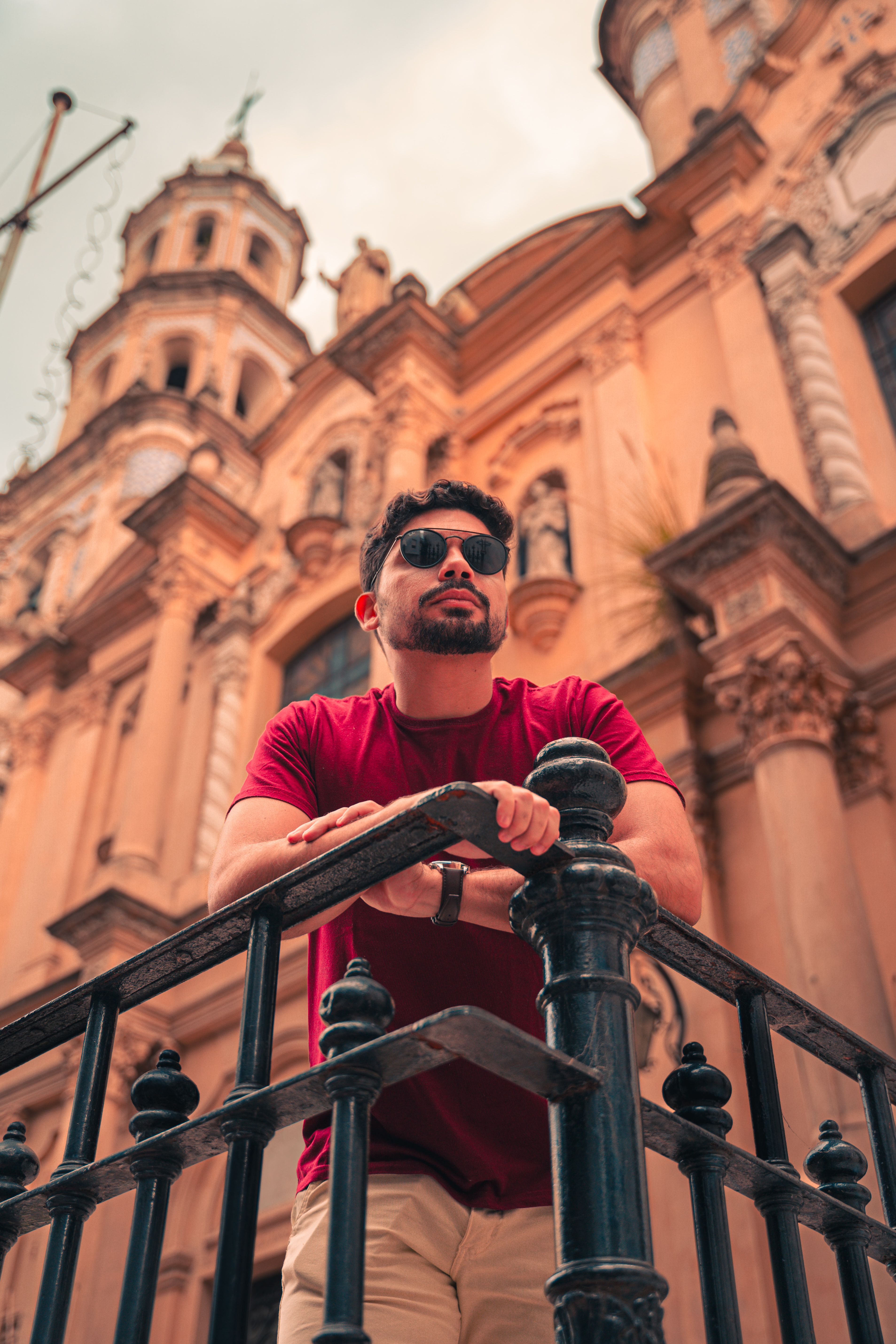 Handsome Man with Sunglasses Posing on Terrace Near Church · Free Stock ...