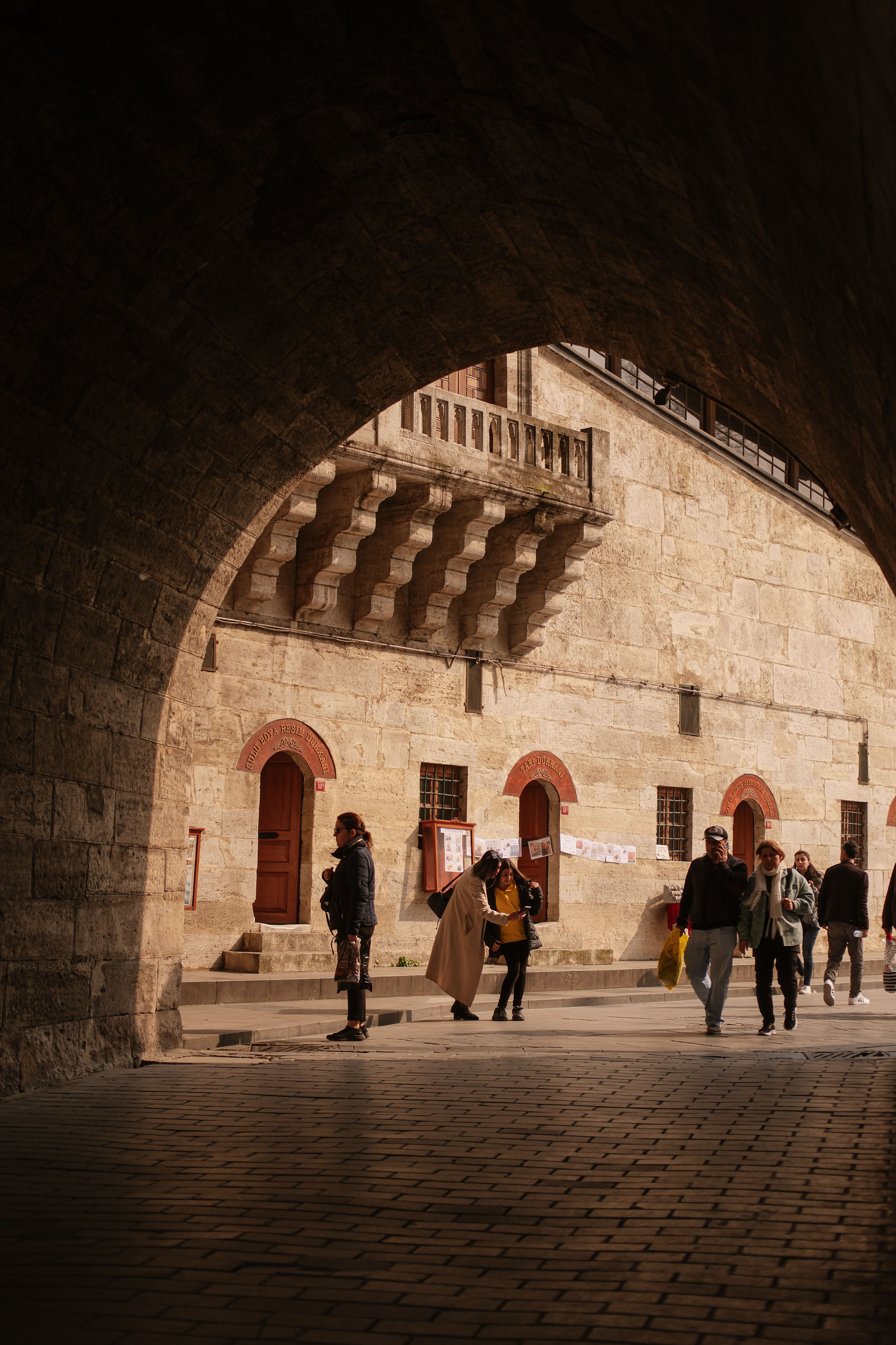 People Walking Through an Archway at the Istanbul Grand Bazar · Free ...