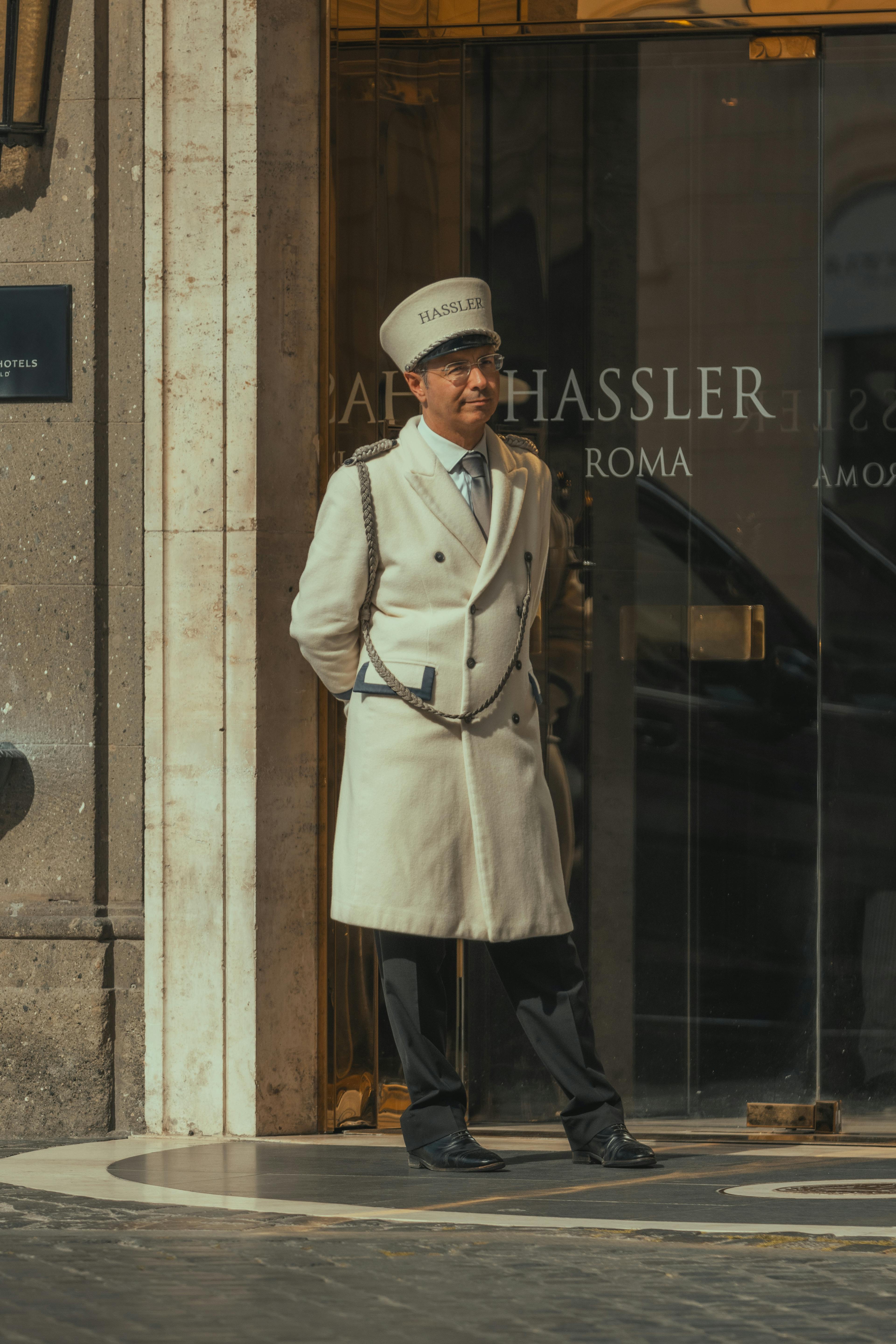 Concierge of Hassler Hotel in Rome in White Coat · Free Stock Photo