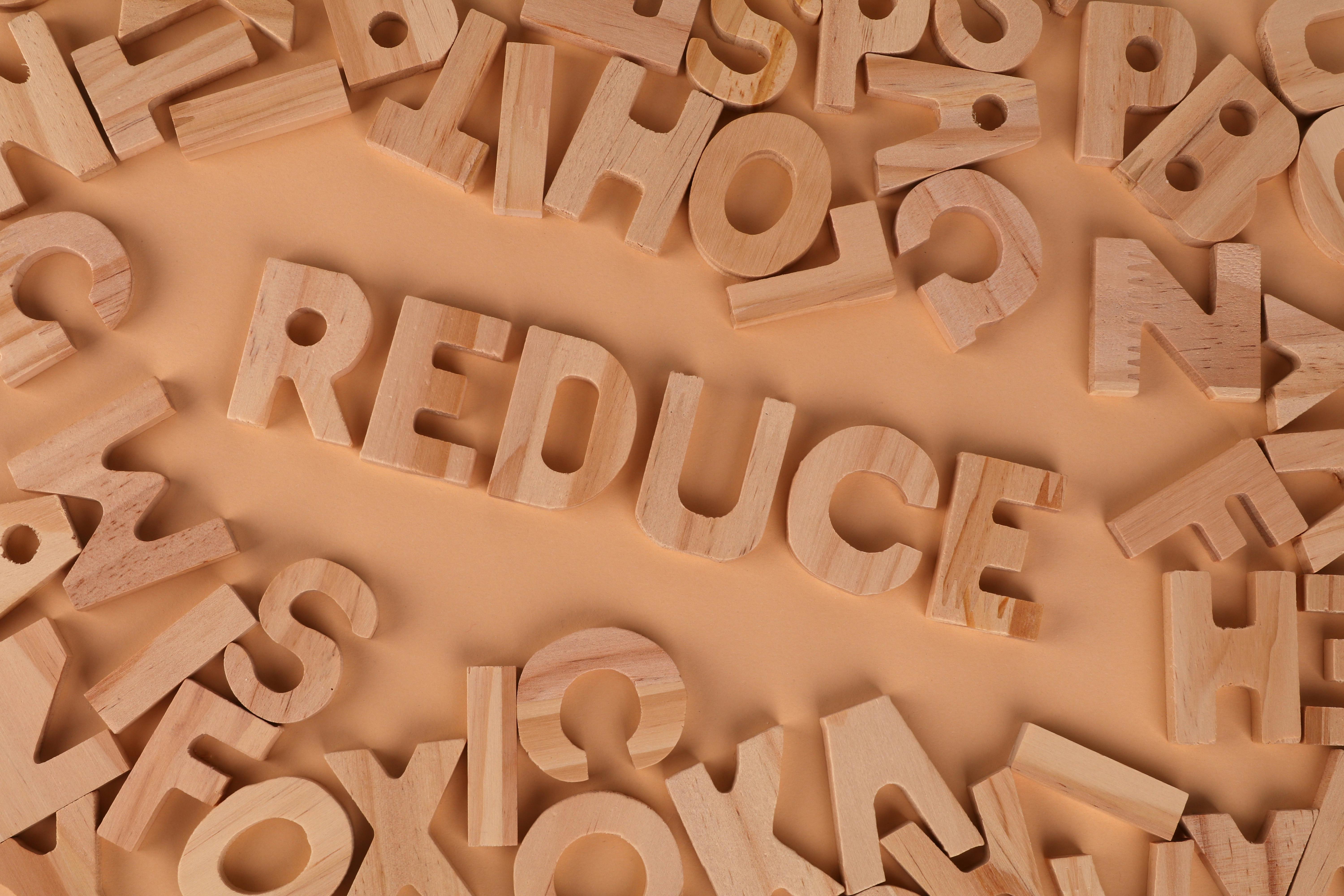 Word Reduce made up of Wooden Letters · Free Stock Photo