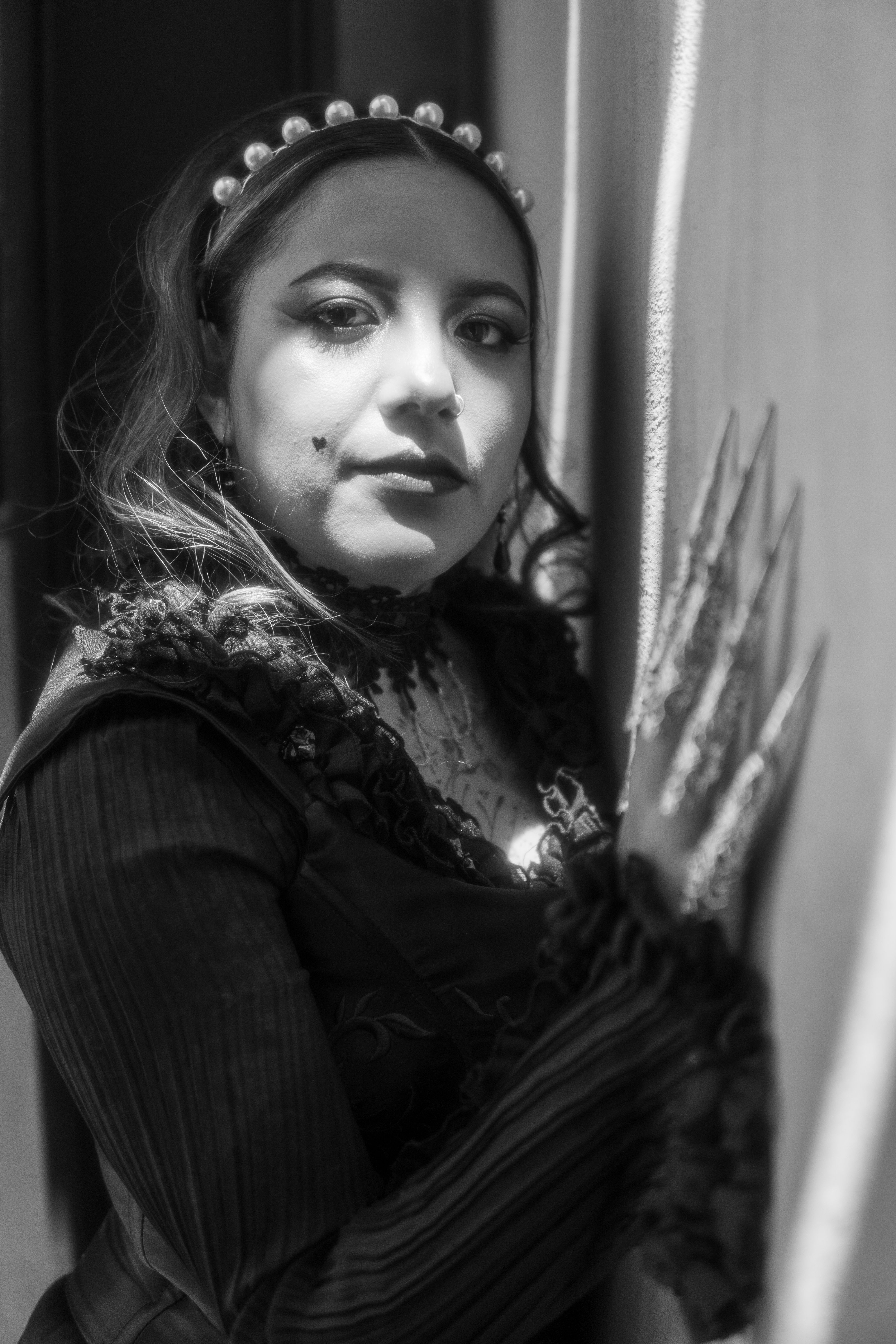 Black and White Photo of a Woman in a Costume and Finger Claws Posing ...
