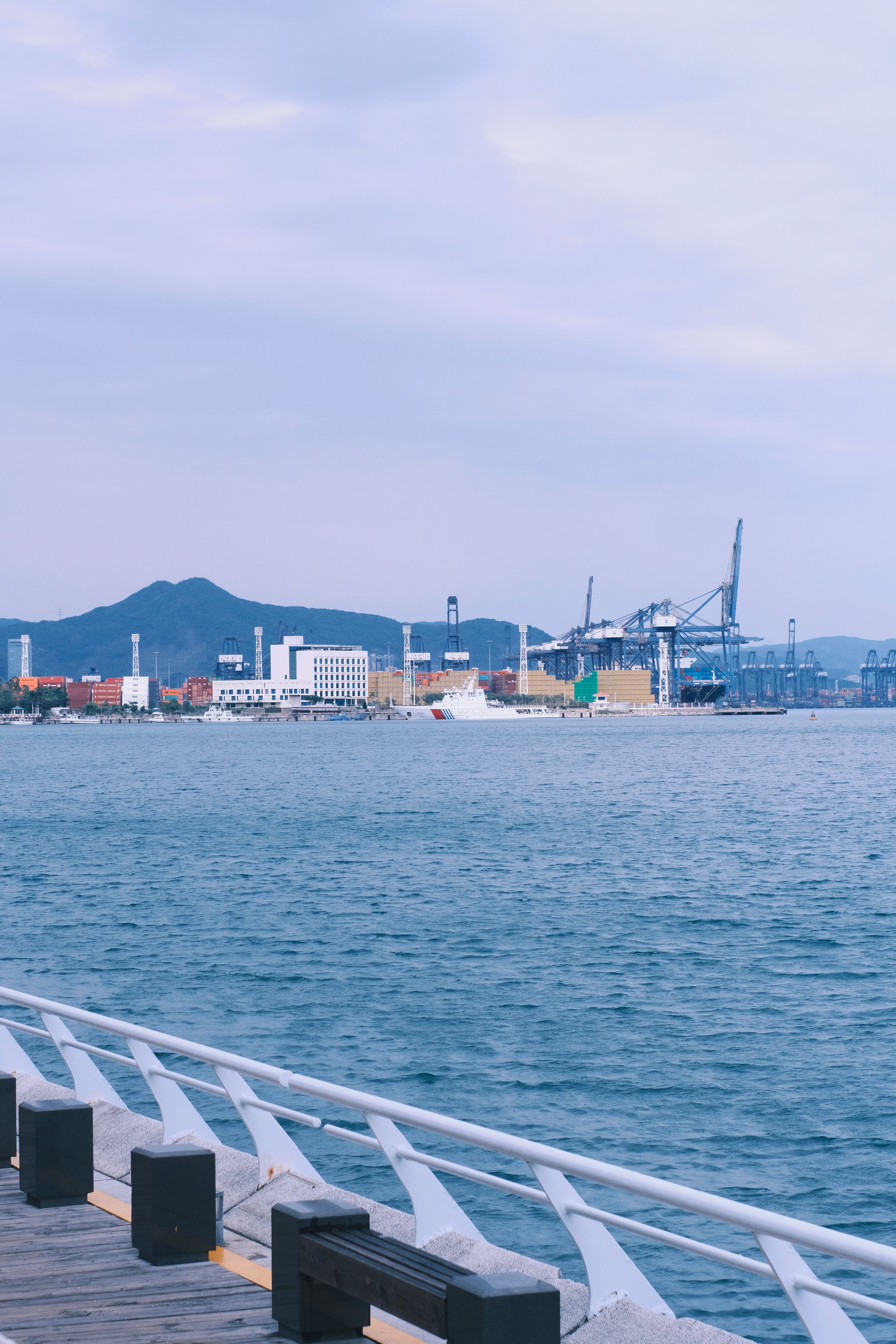 Harbor Building behind Promenade · Free Stock Photo