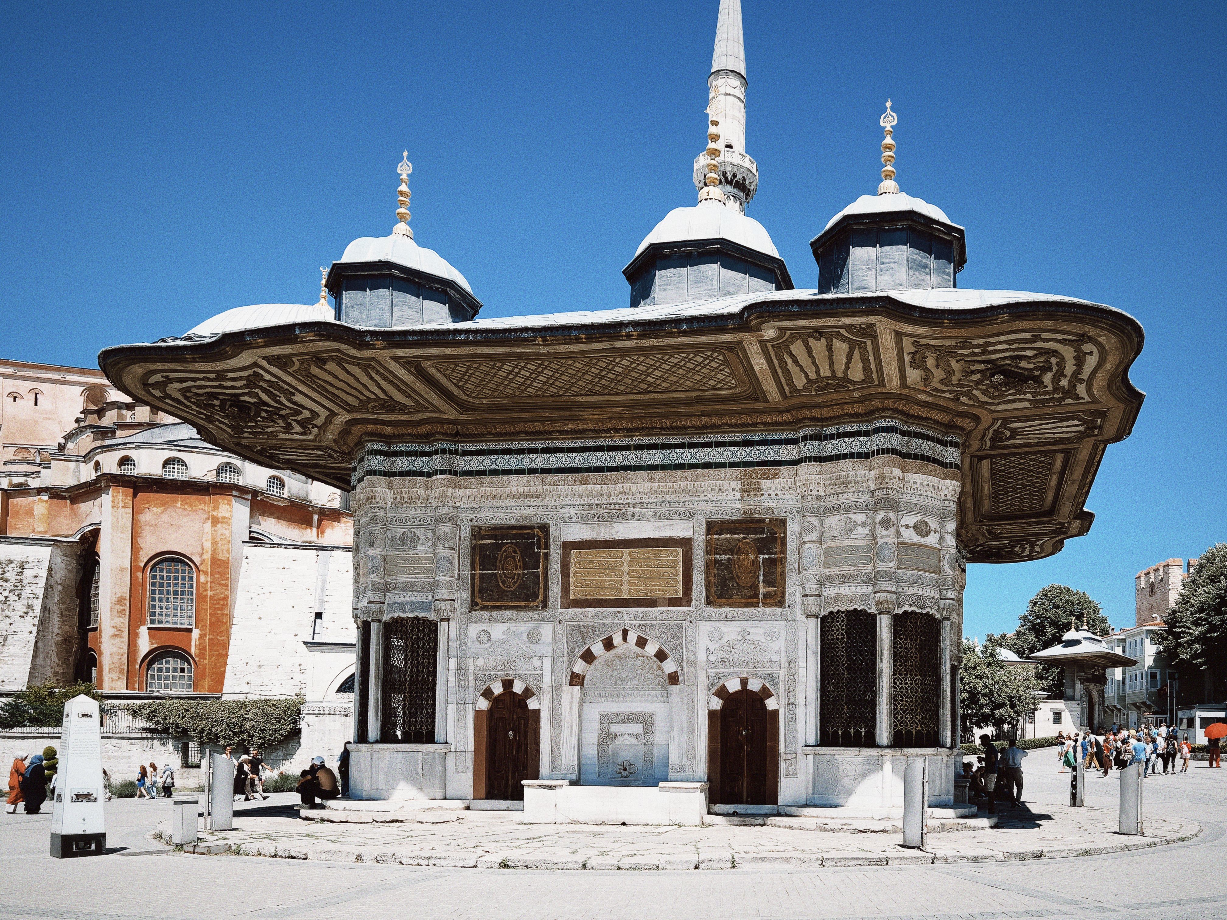 A mosque with two domes and a white roof · Free Stock Photo