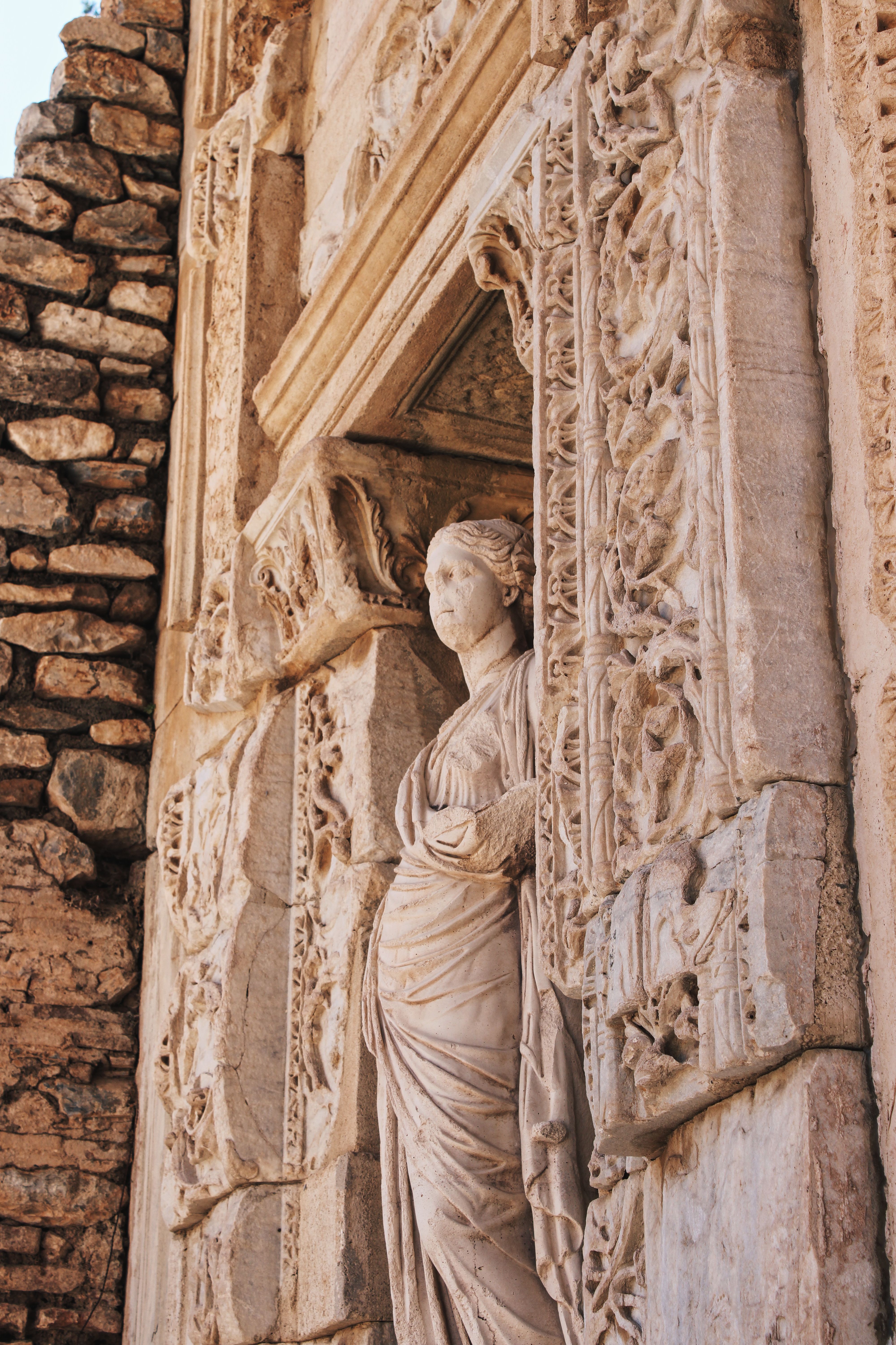 Close-up of a Statue Carved on the Wall of the Library of Celsus in ...