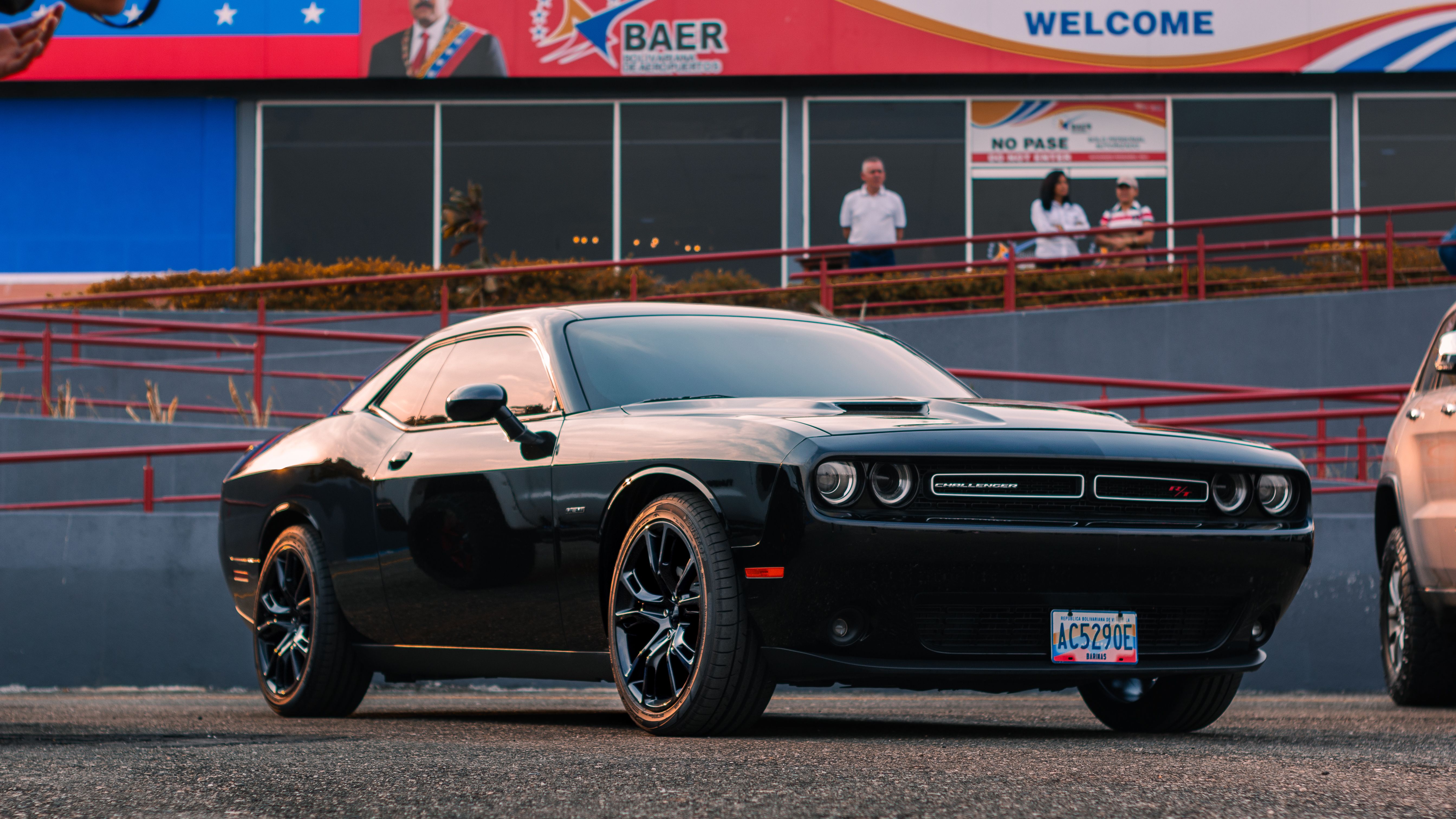 A Parked Dodge Challenger with an Open Hood · Free Stock Photo