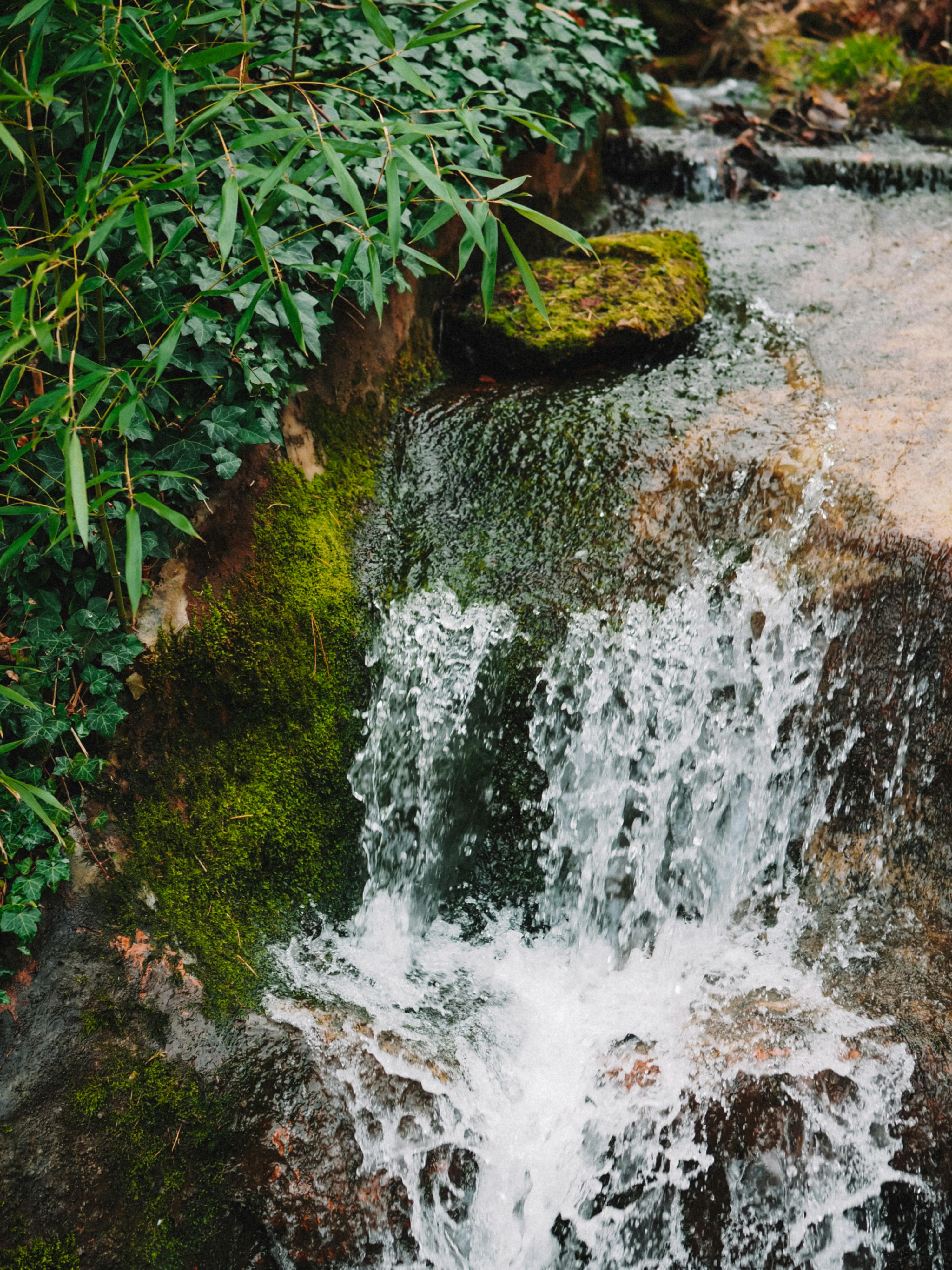 Close-up of Splashing Water of a Small Cascade · Free Stock Photo
