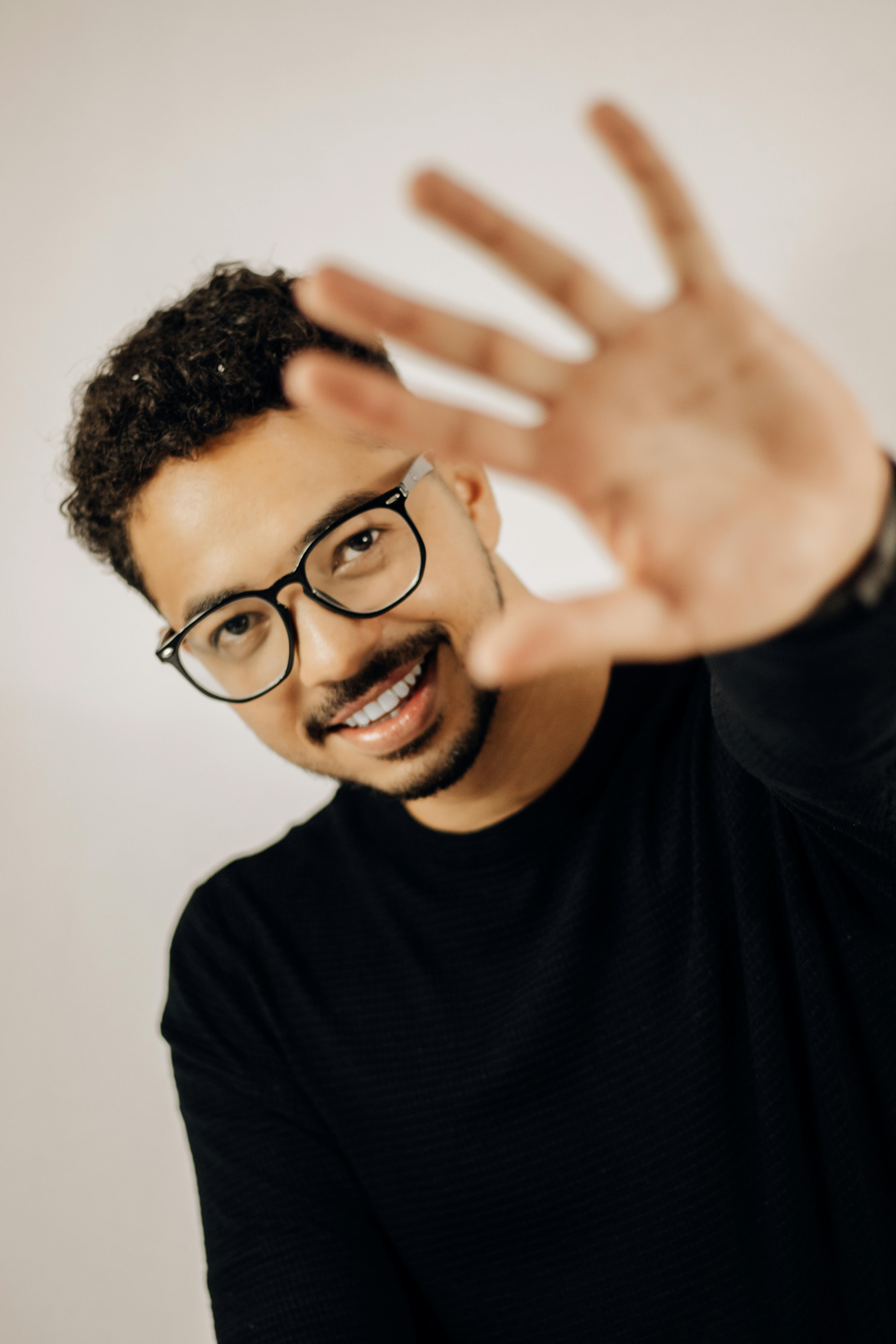 Man Raising His Right Arm · Free Stock Photo