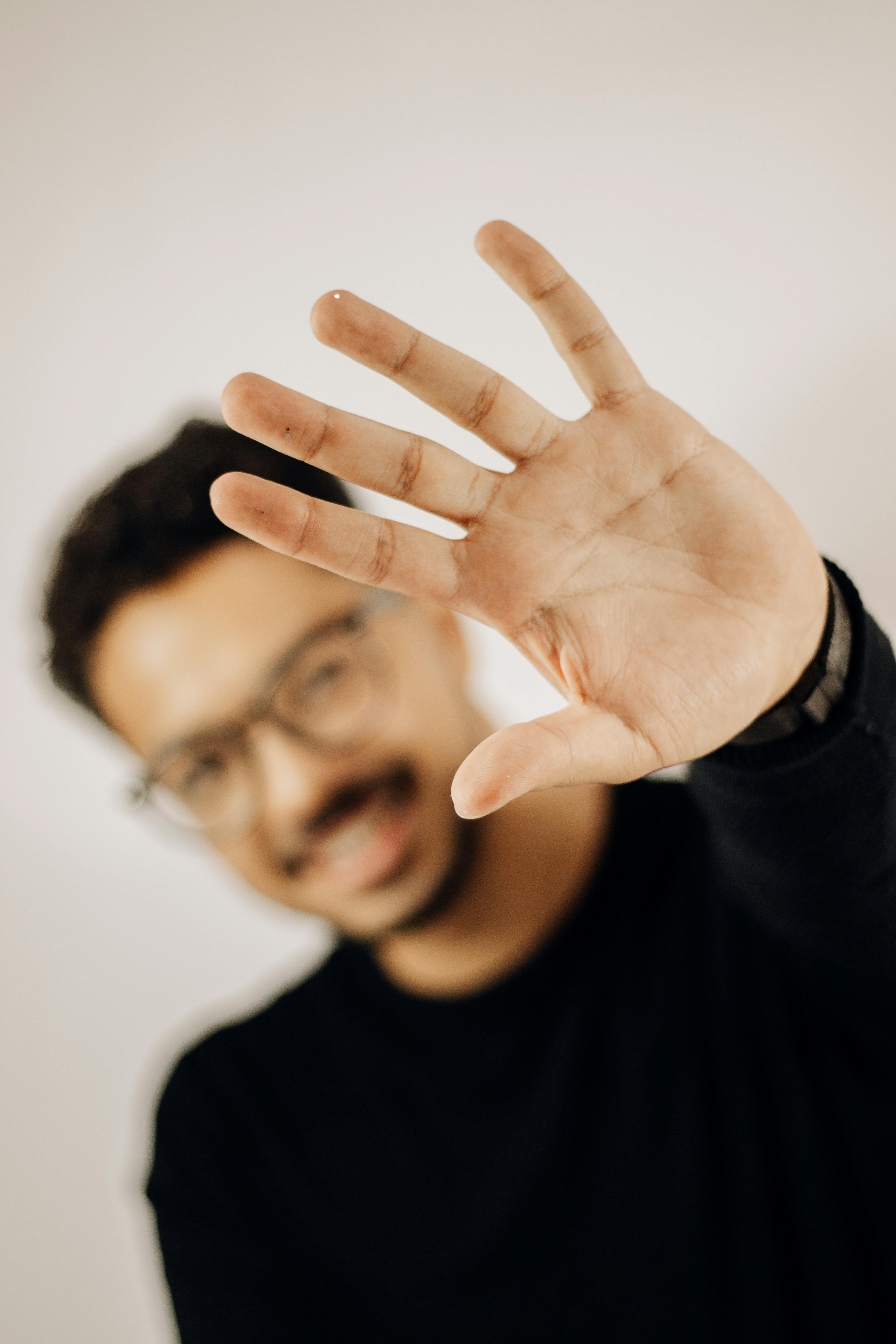 Bearded Man Pointing Up · Free Stock Photo