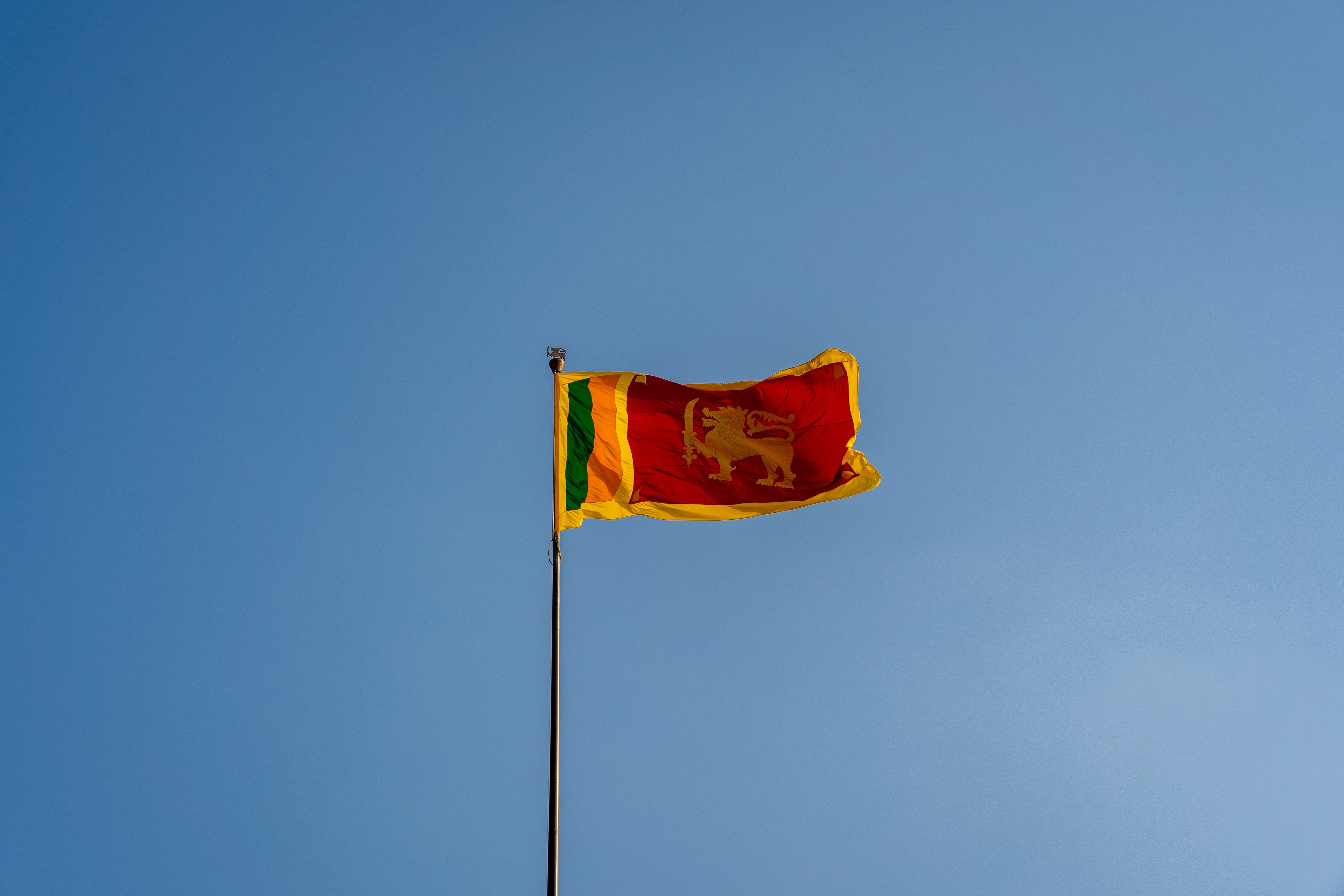 Sri Lanka Flag Fluttering in the Wind · Free Stock Photo