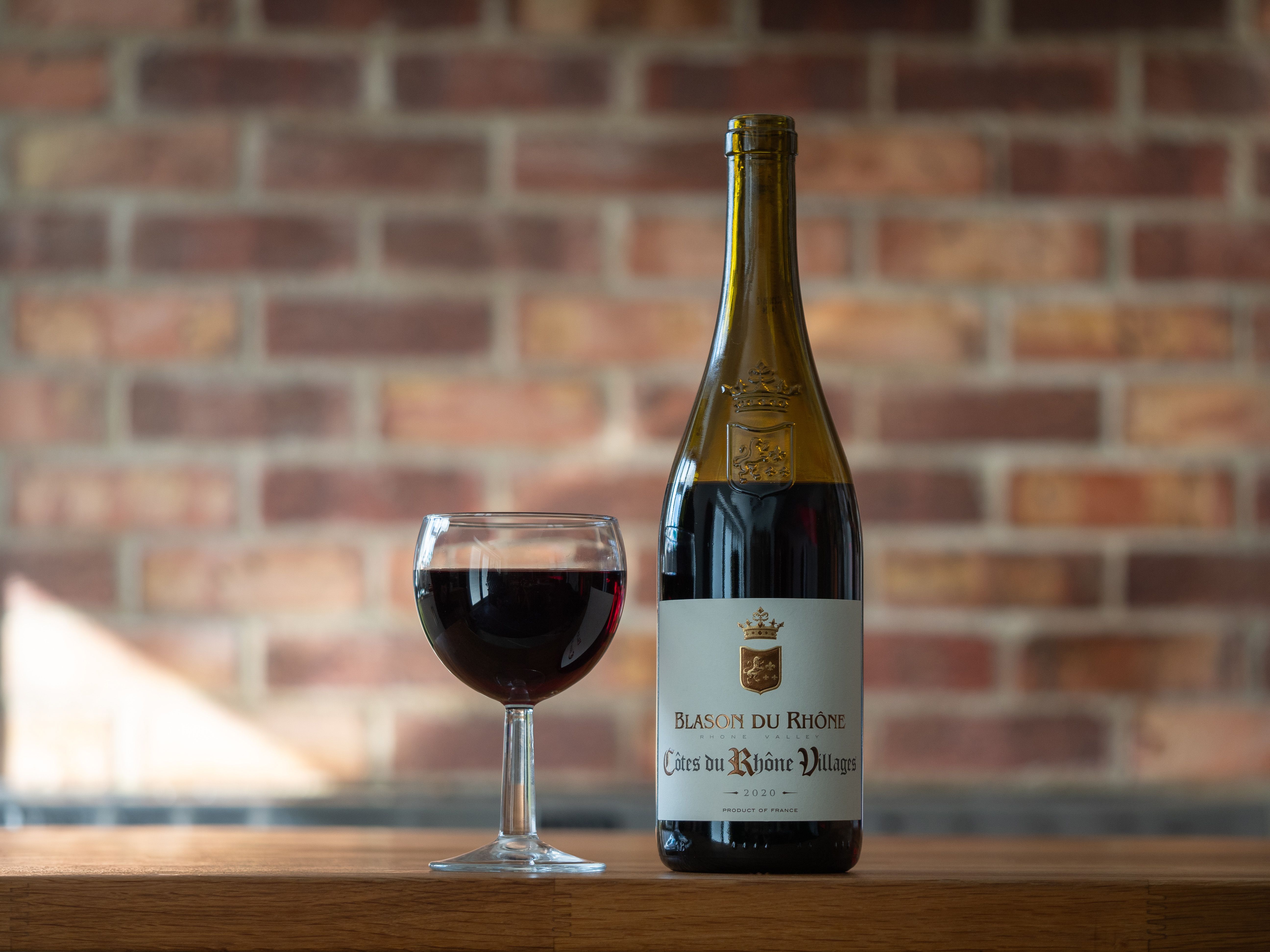 Selective Focus of Wine Glass and Wine Bottle · Free Stock Photo