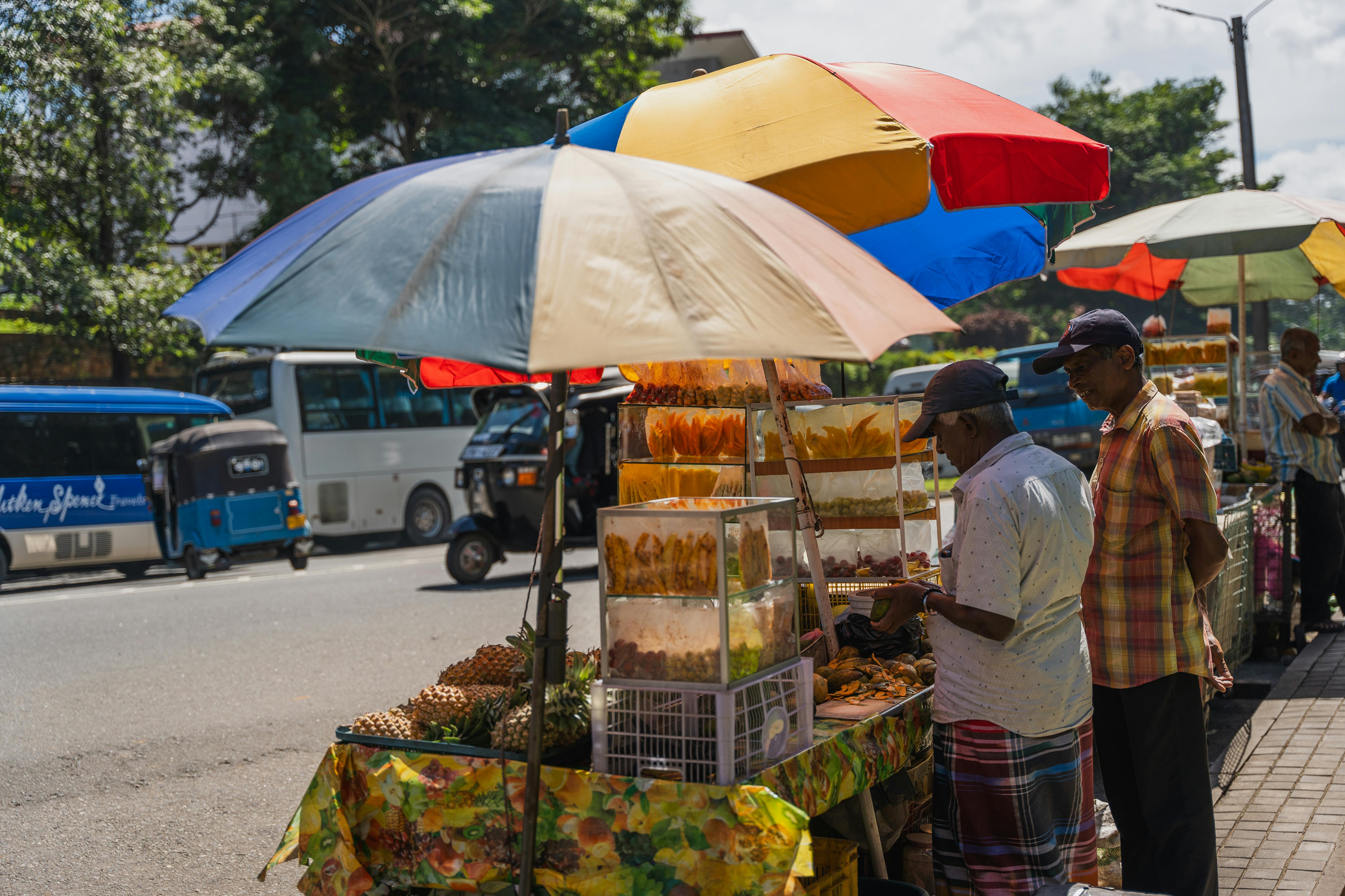 Outdoor Fruit Market under Sunshades · Free Stock Photo