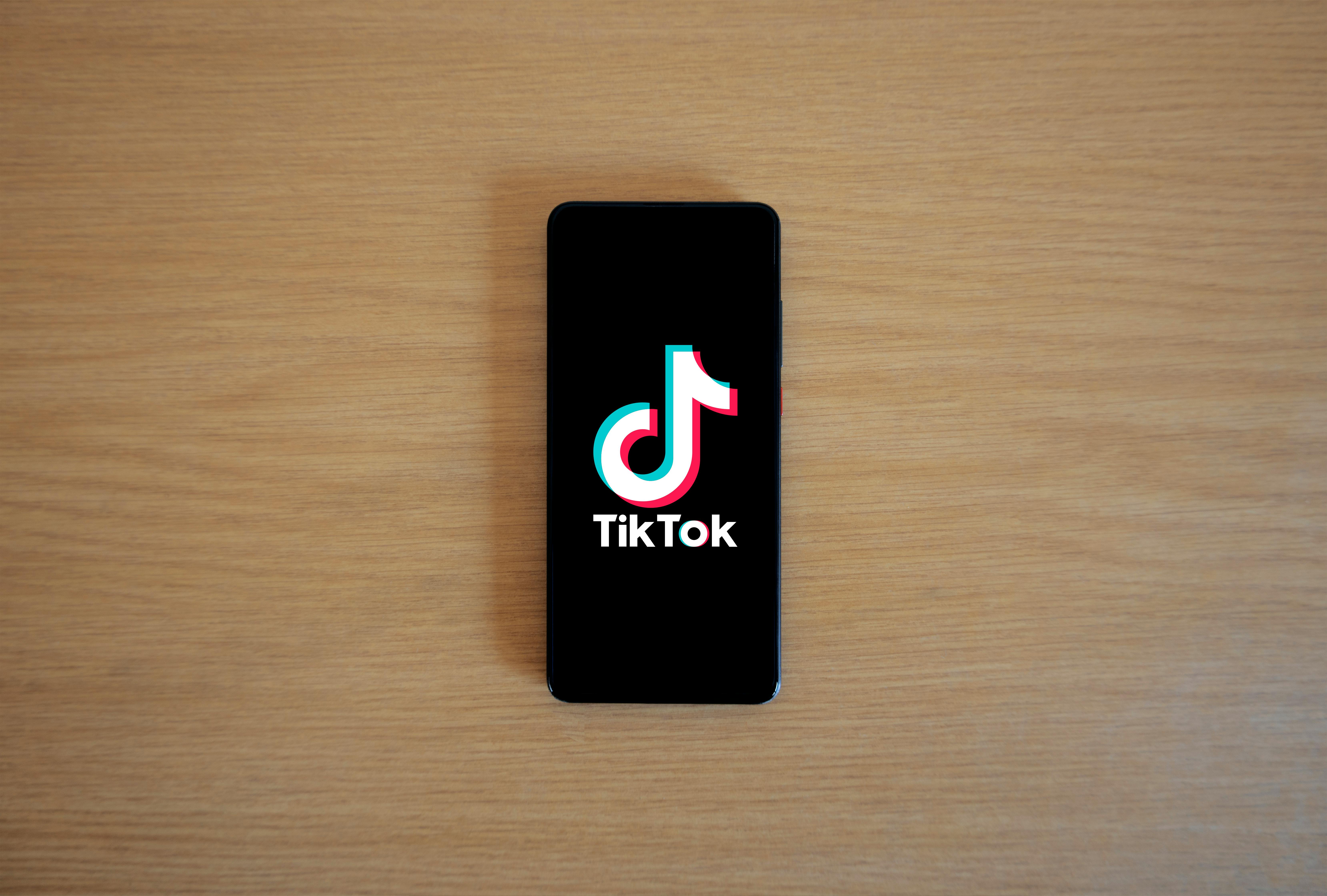 Tik Tok Logo on Smartphone · Free Stock Photo