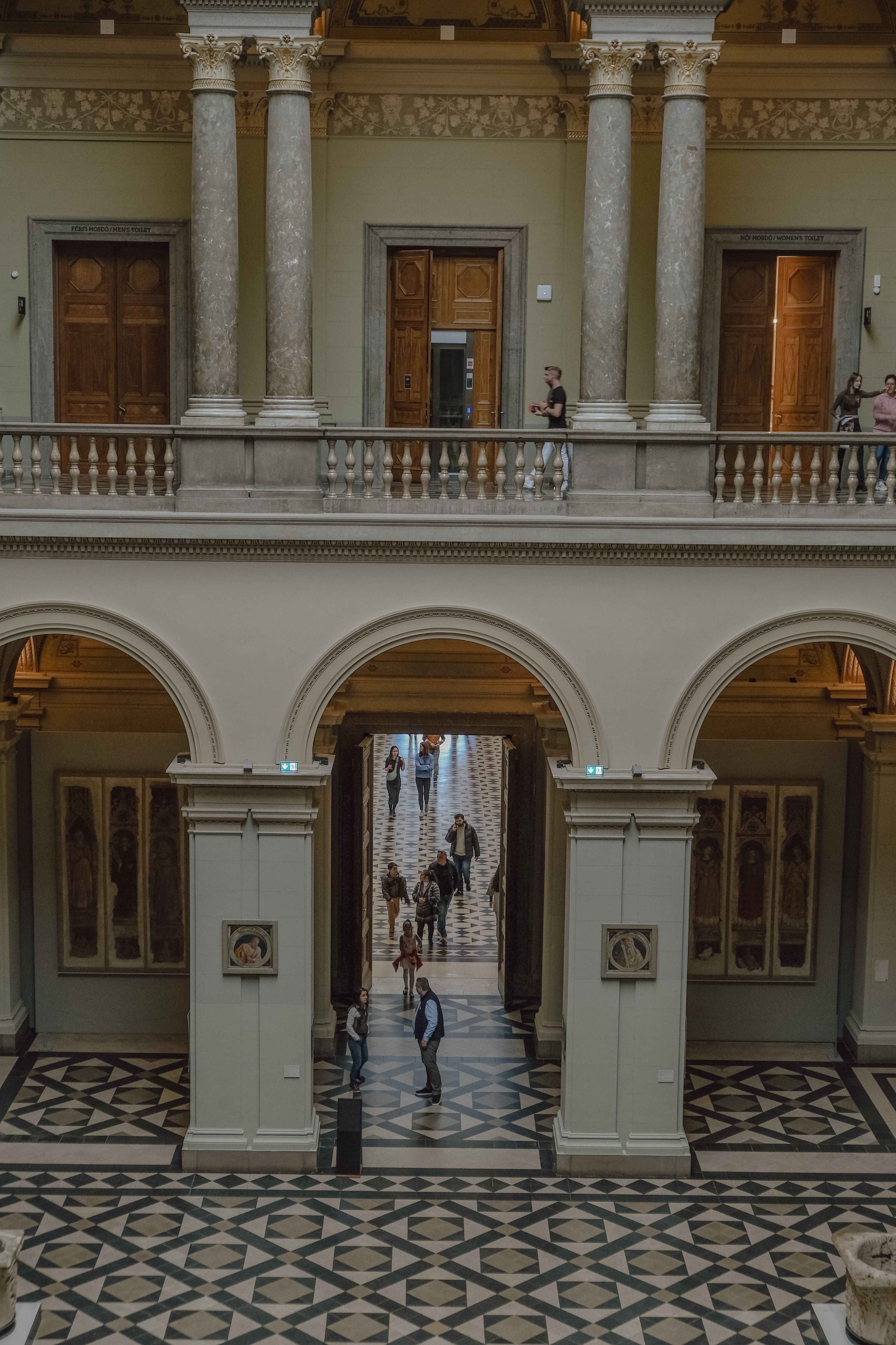A view of the inside of a building with people walking around · Free ...