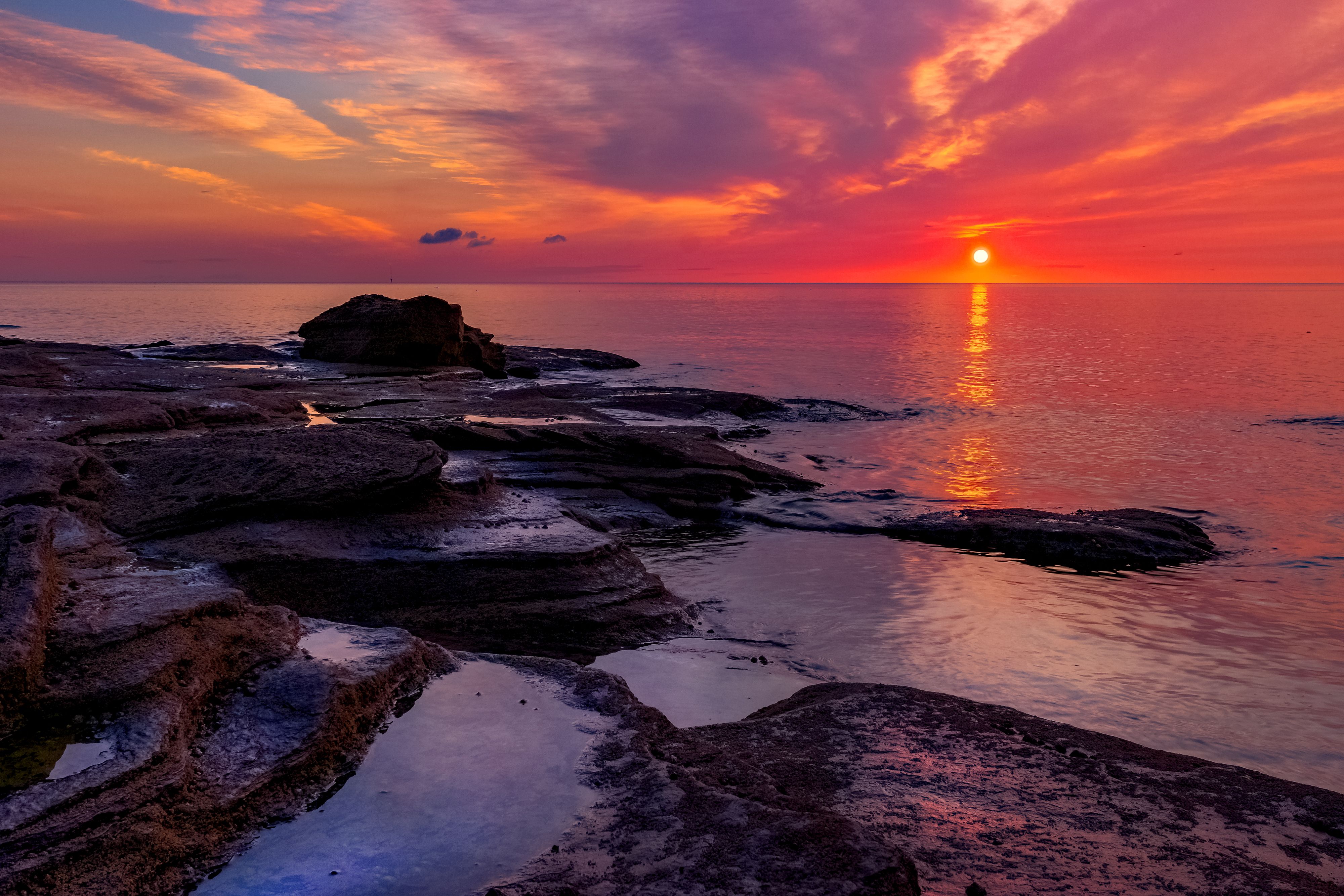 Red Sky over Sea Shore at Sunset · Free Stock Photo