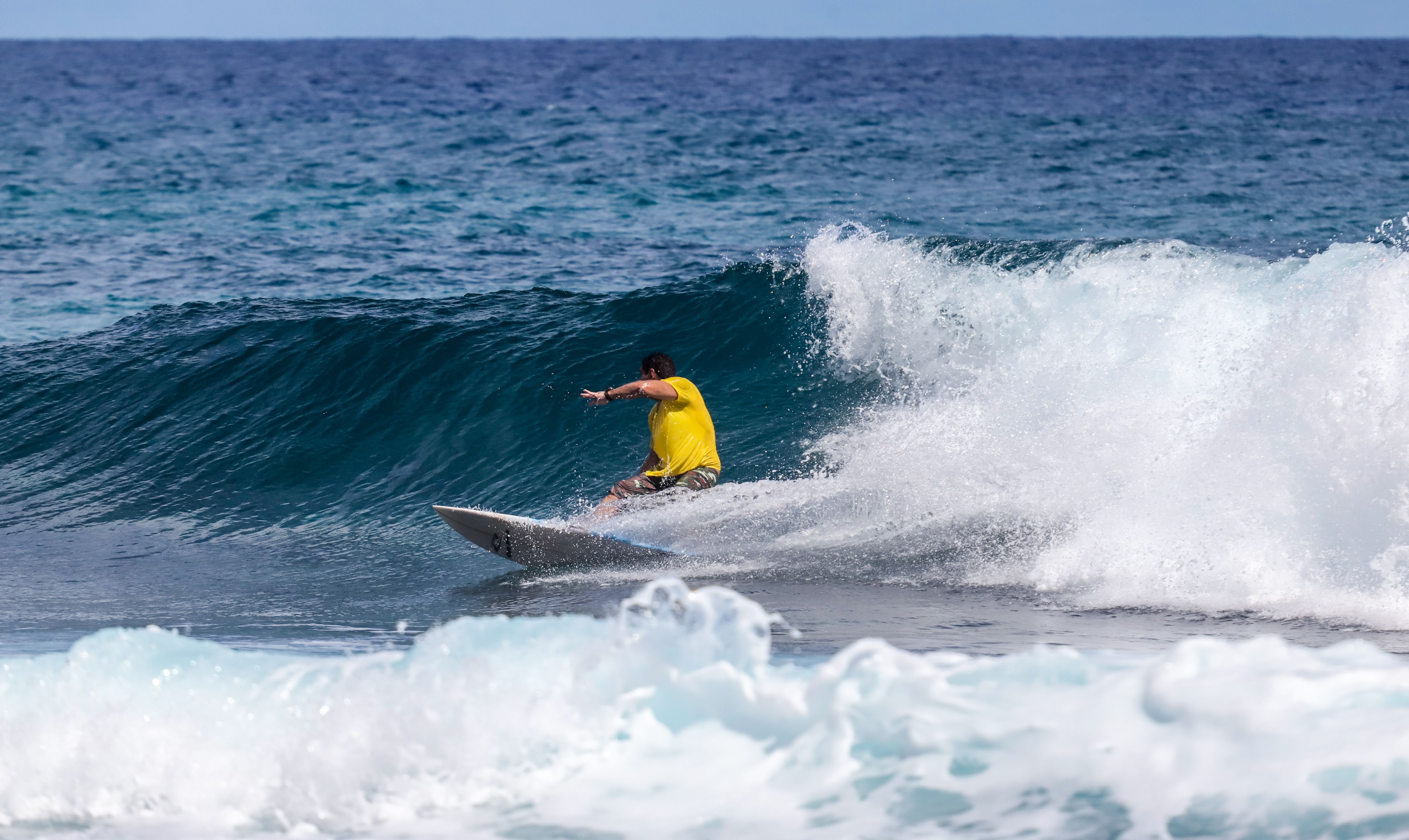 Photo of Man Surfing on Wave · Free Stock Photo