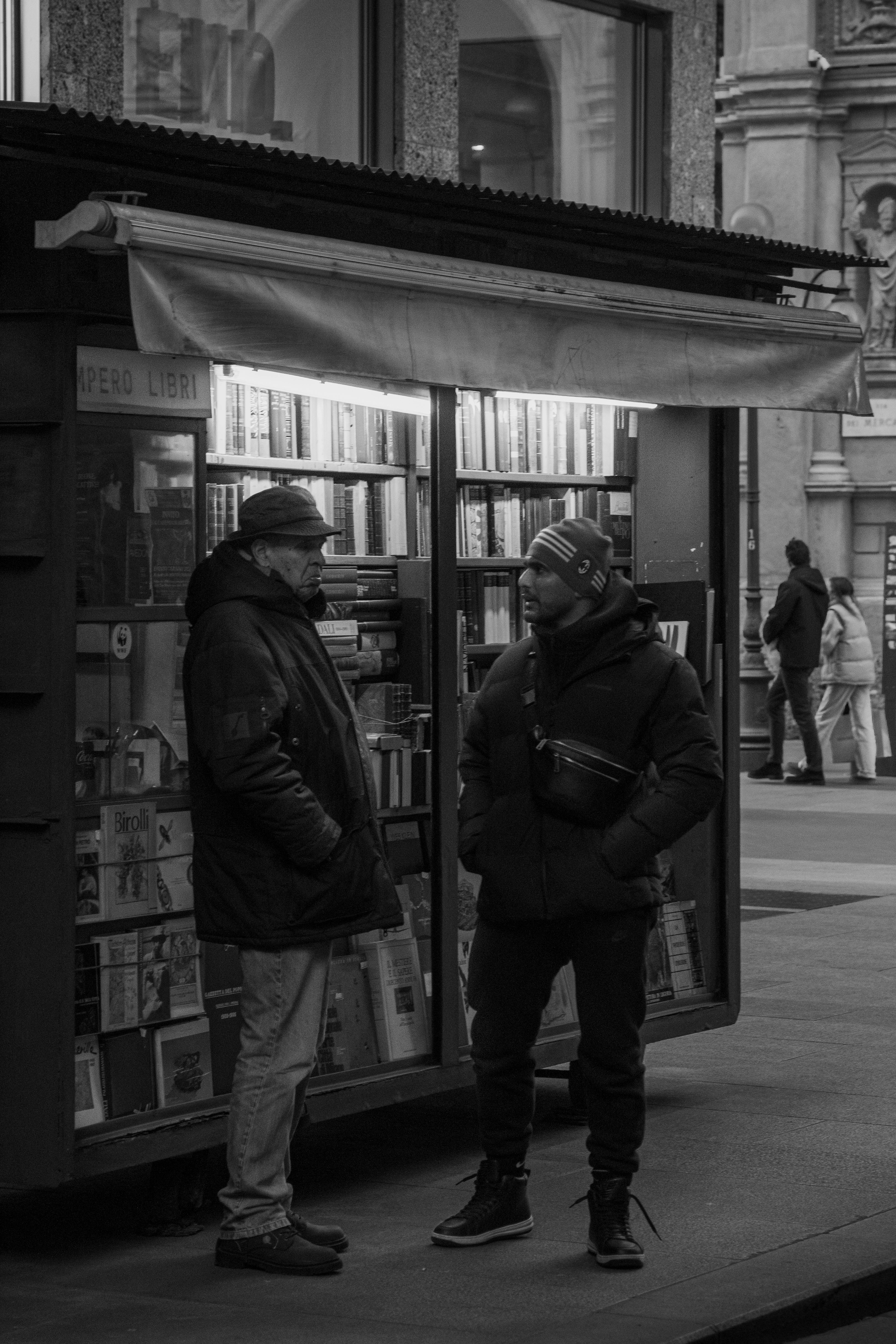 Man Standing by Newsagent · Free Stock Photo