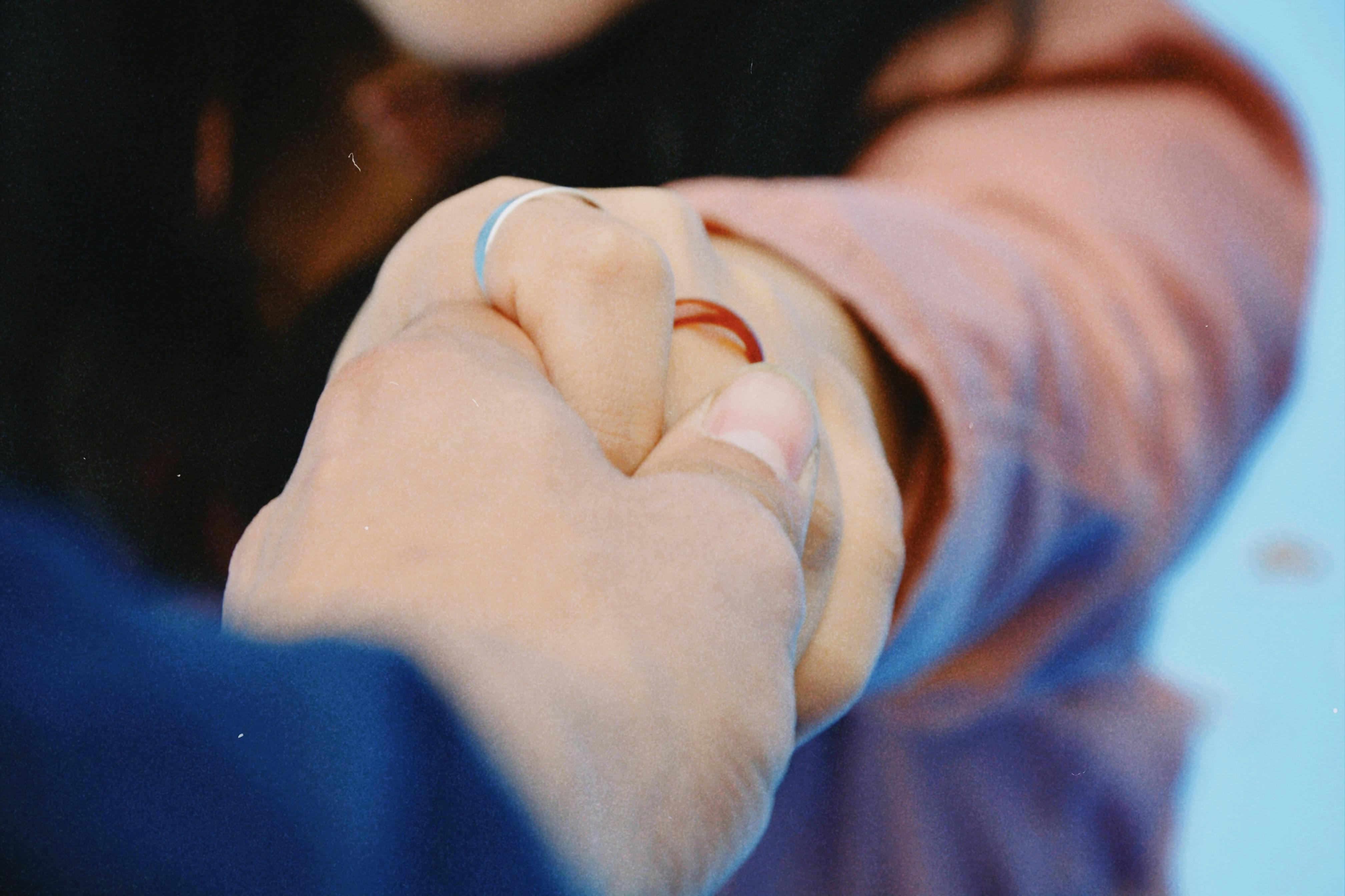 Woman Holding Man's Hand · Free Stock Photo
