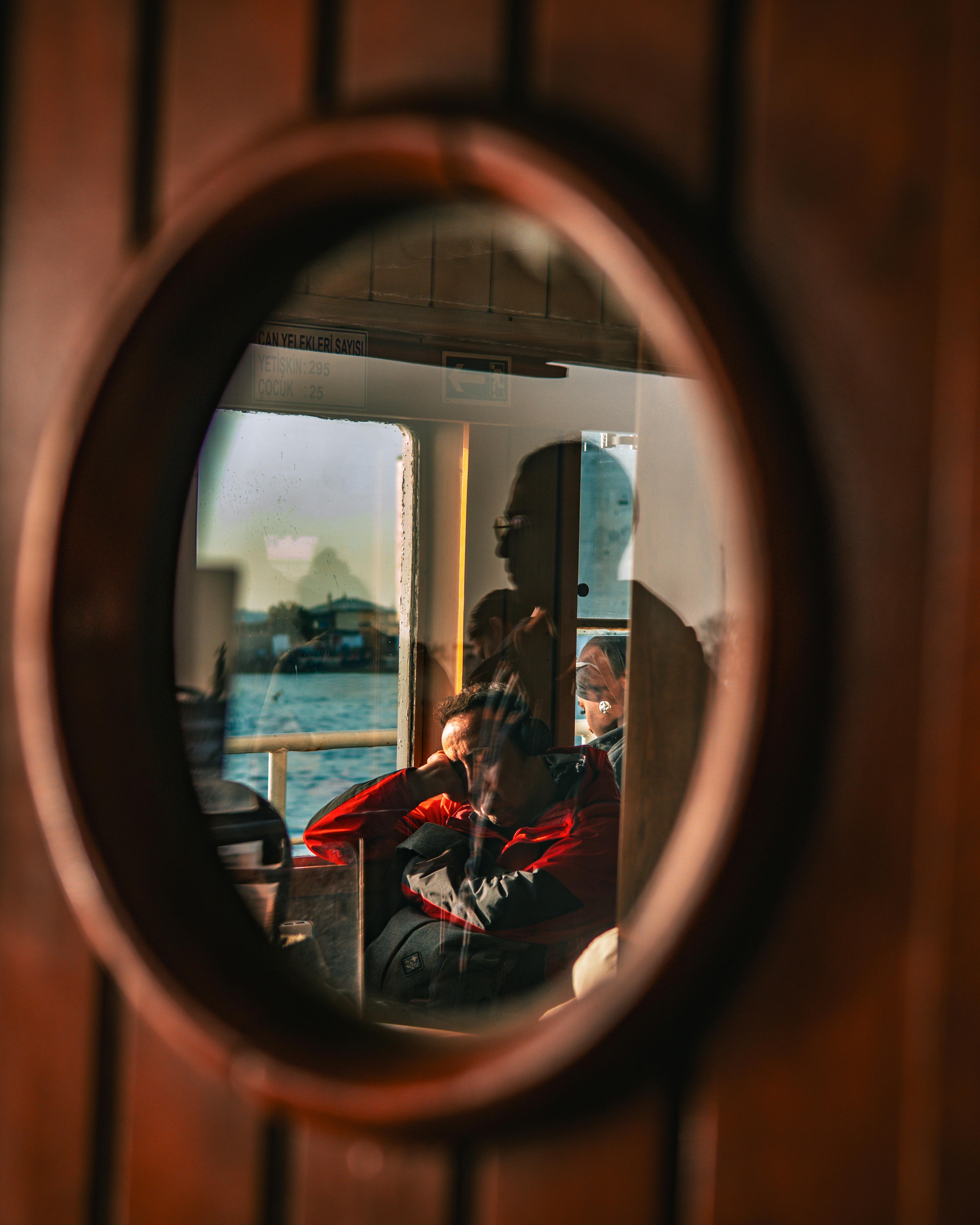 Passengers behind Ferry Window · Free Stock Photo