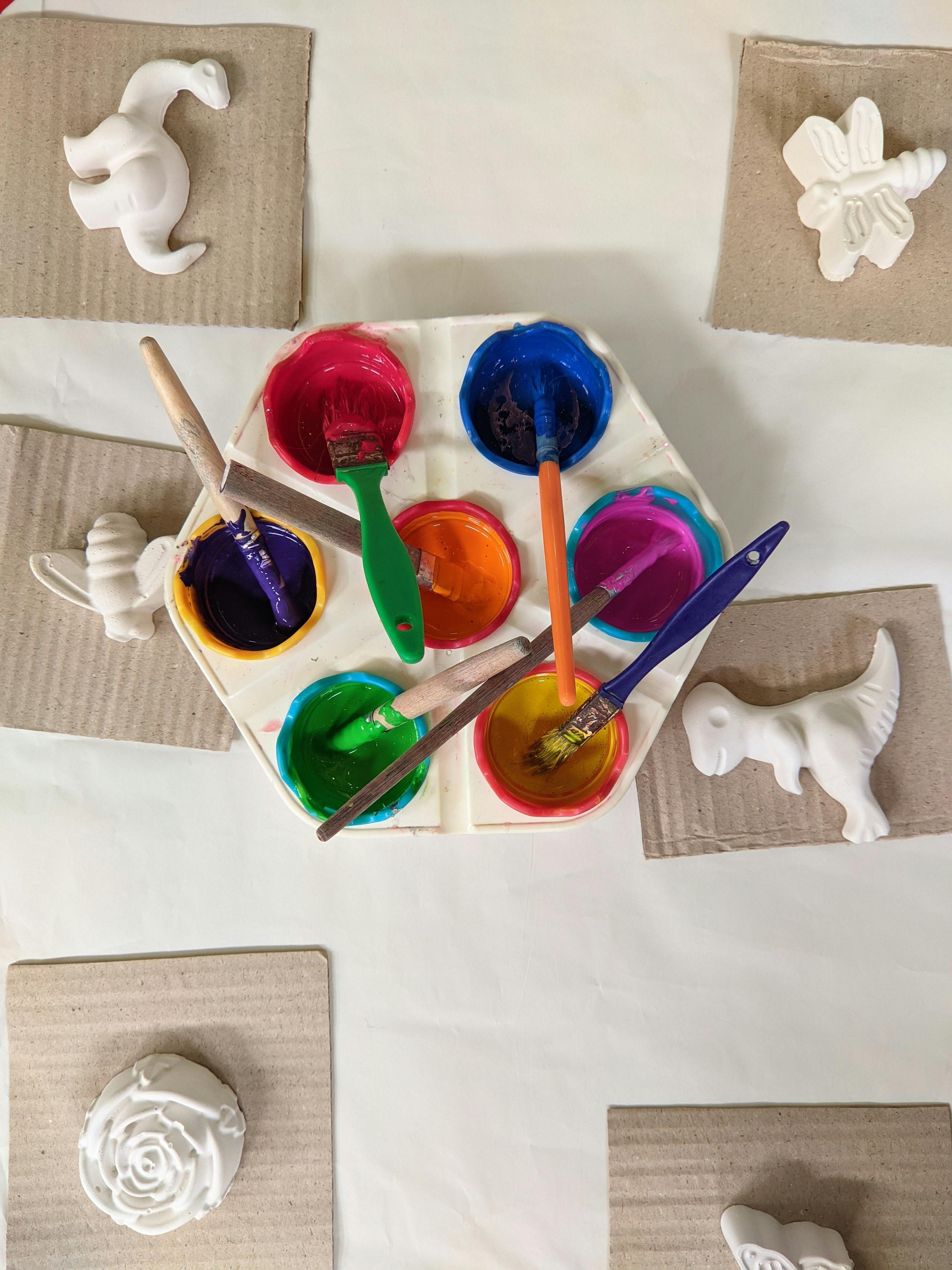 Colorful Paints and Handmade Figurines · Free Stock Photo