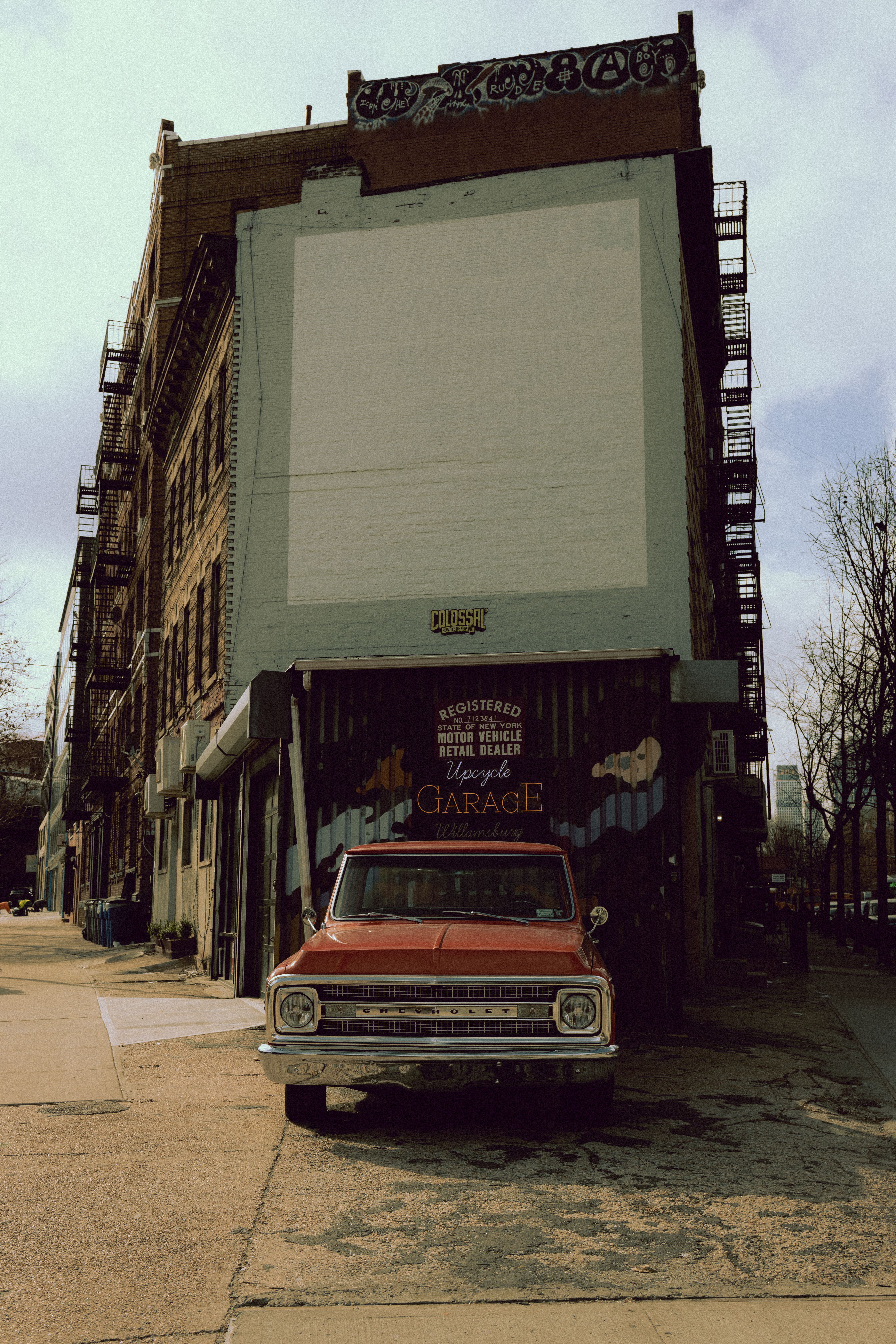 Red Car by Garage · Free Stock Photo
