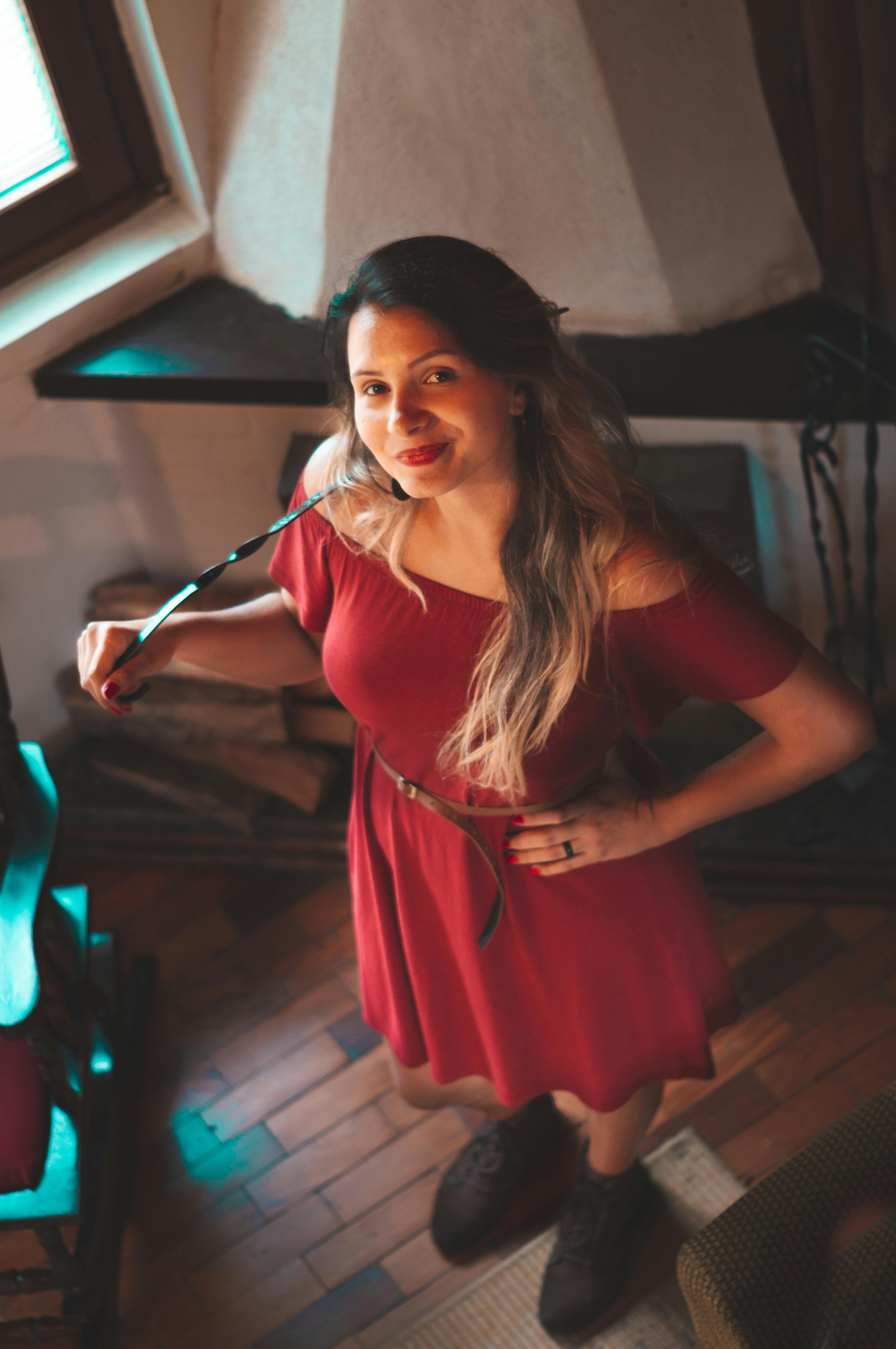 Smiling Woman in Red Dress · Free Stock Photo