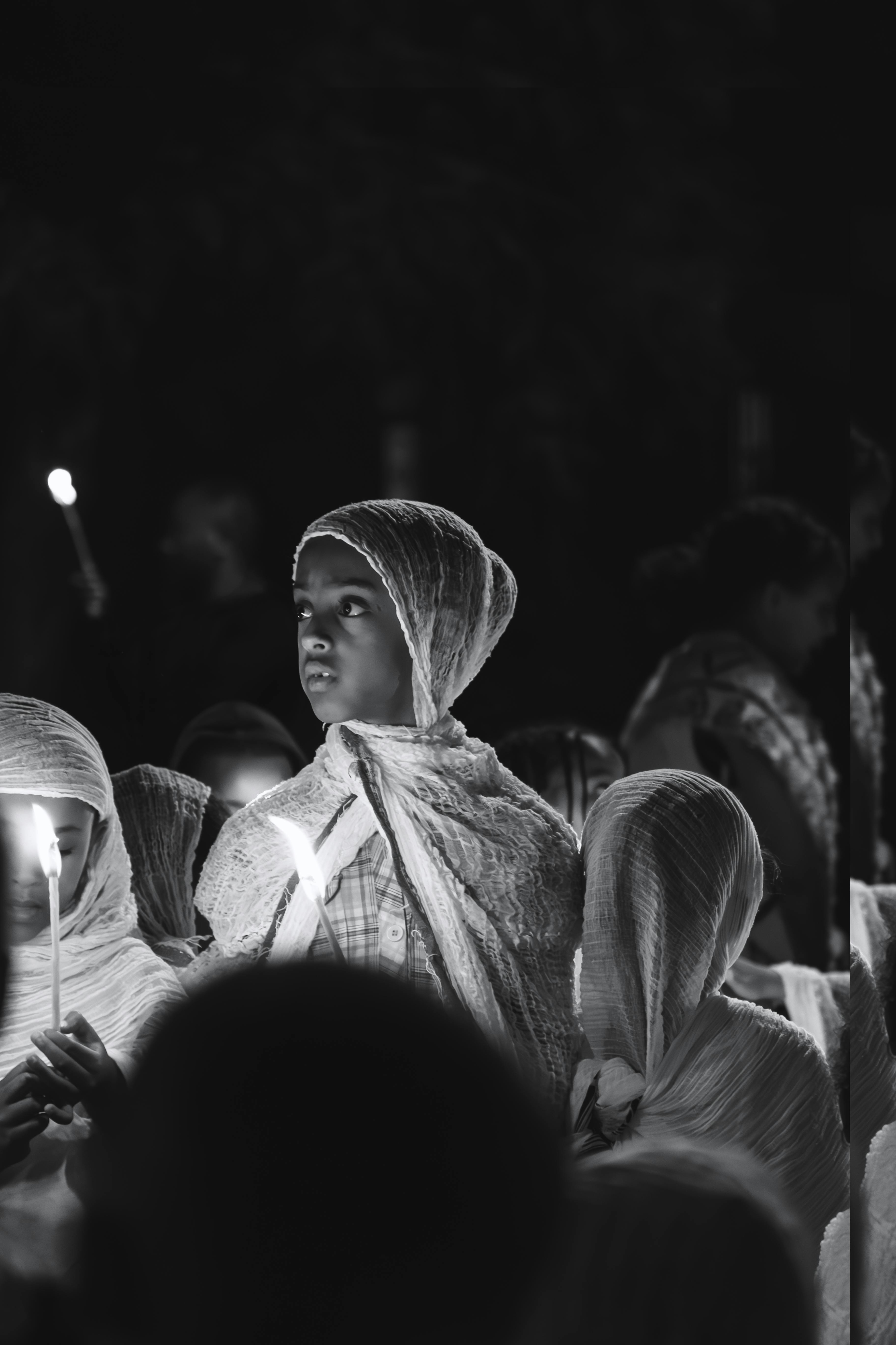 Woman in Hijab Standing with Candle in Religion Ceremony · Free Stock Photo