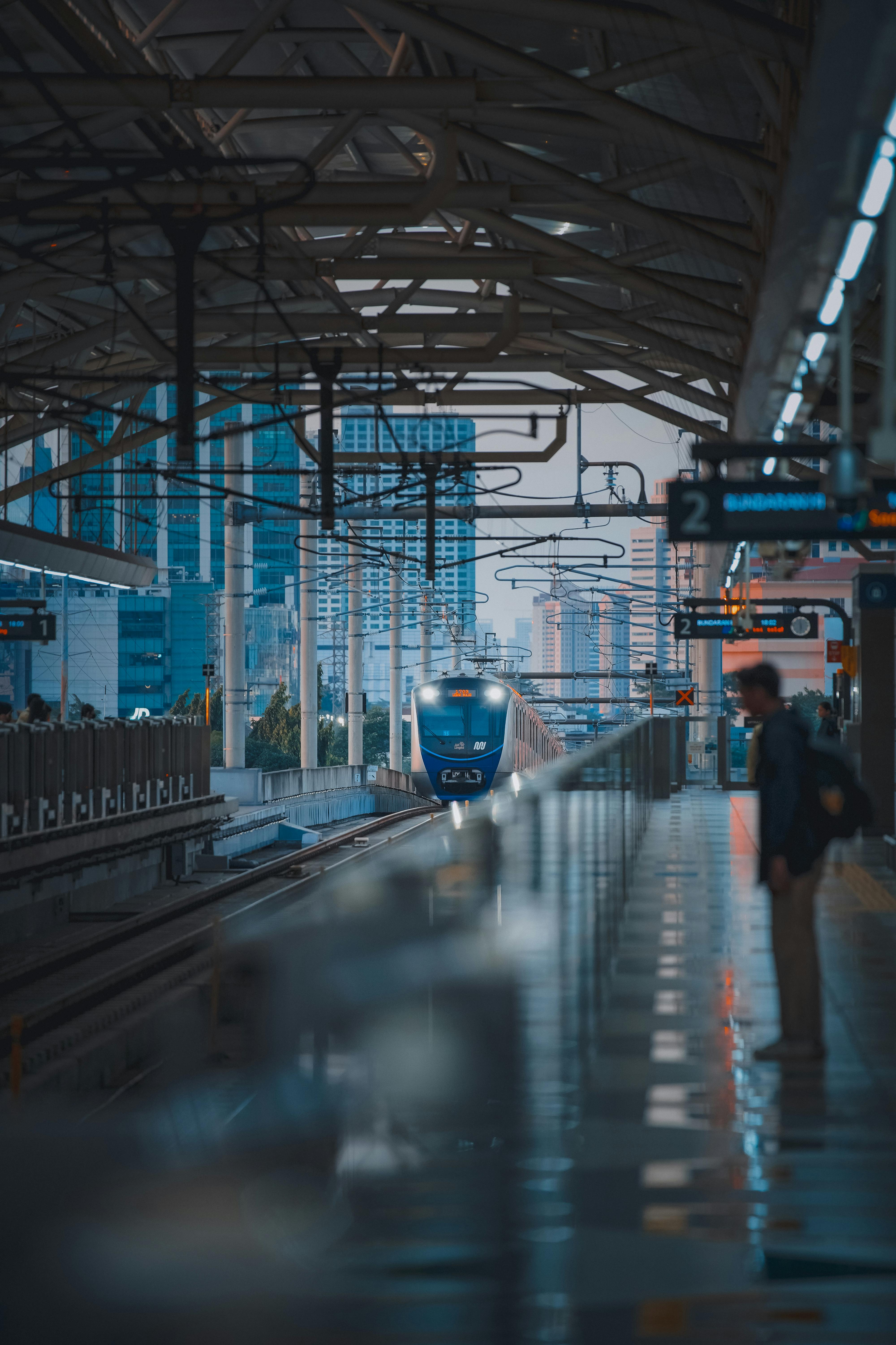 Train Arriving at Railway Station · Free Stock Photo