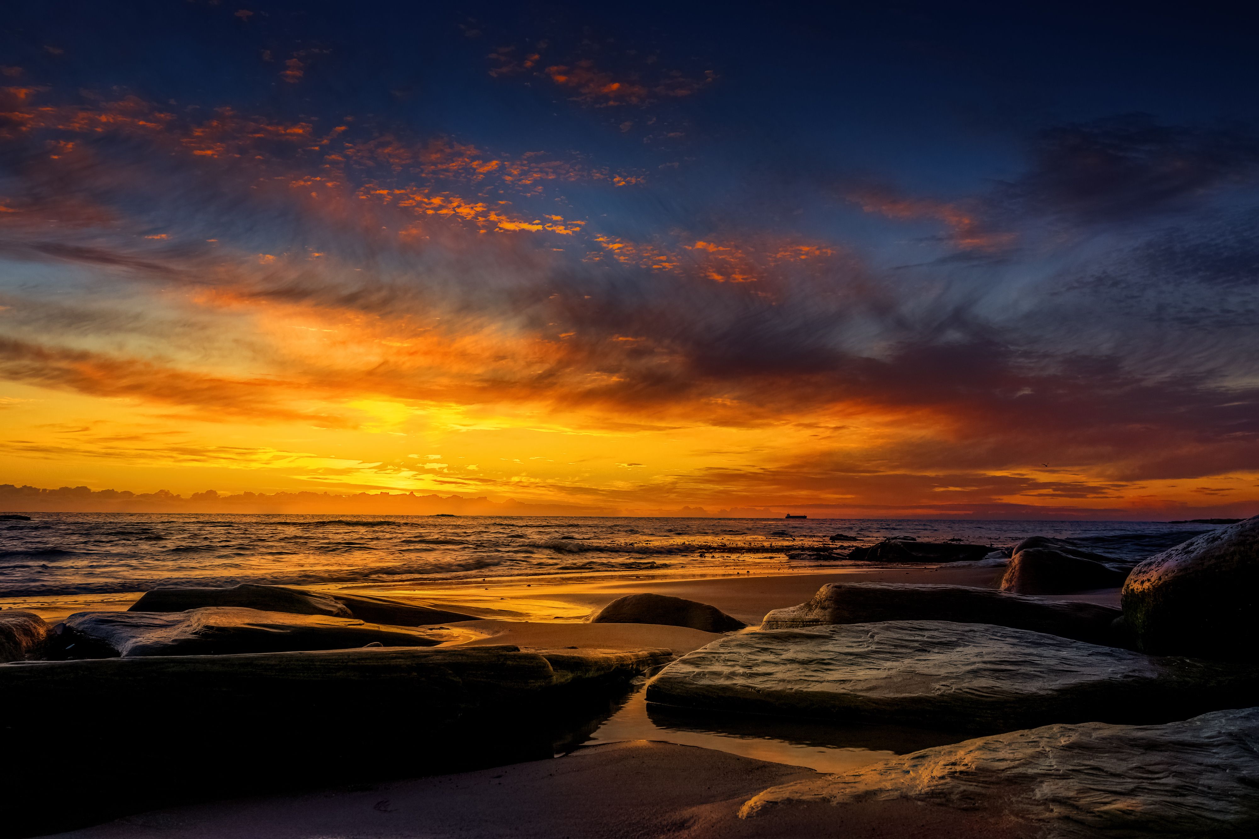 Rocks on Beach at Sunset · Free Stock Photo