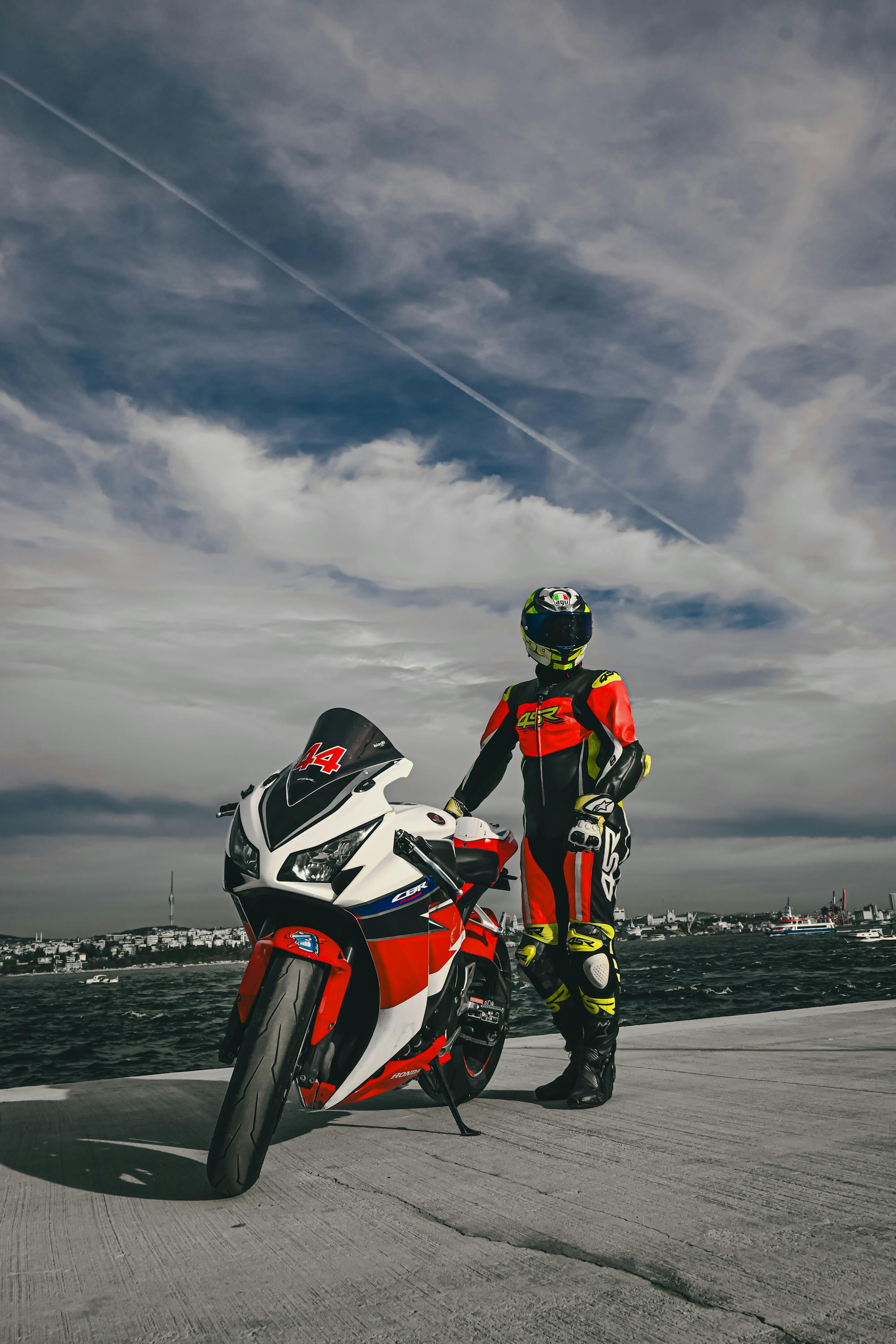 Standing Rider by Racing Motorcycle · Free Stock Photo